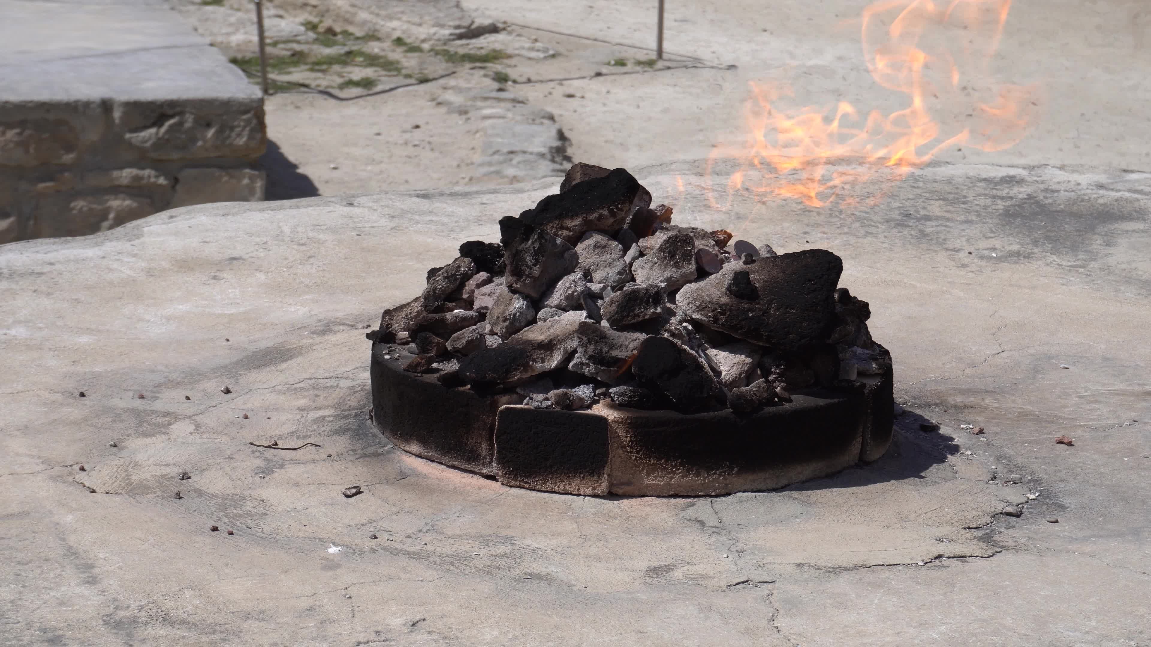 Eternal Flame Burning on Outdoor Stone Surface Free Stock Video Footage ...
