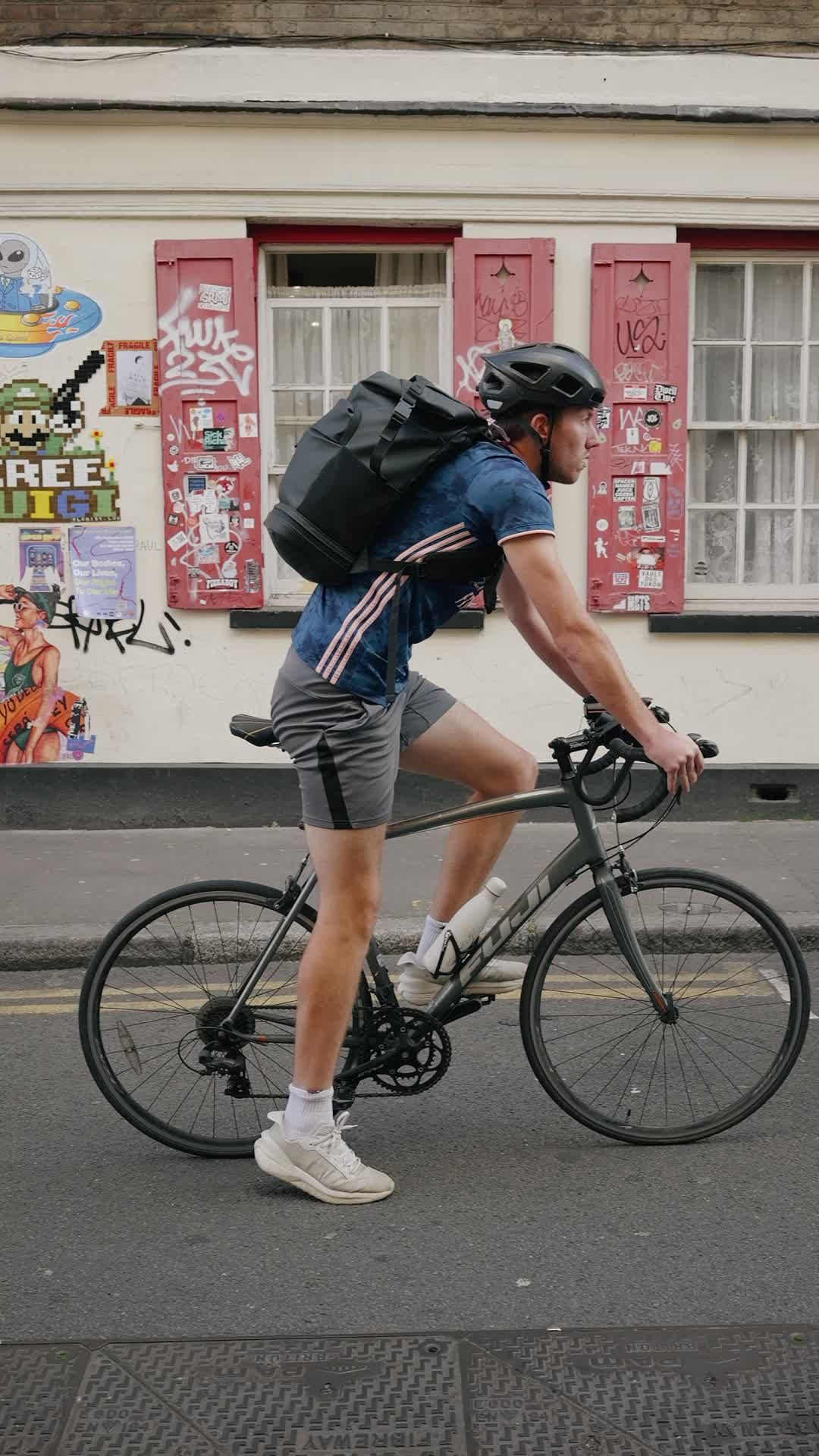 Urban Bike Commuter in Vibrant City Setting Free Stock Video Footage ...