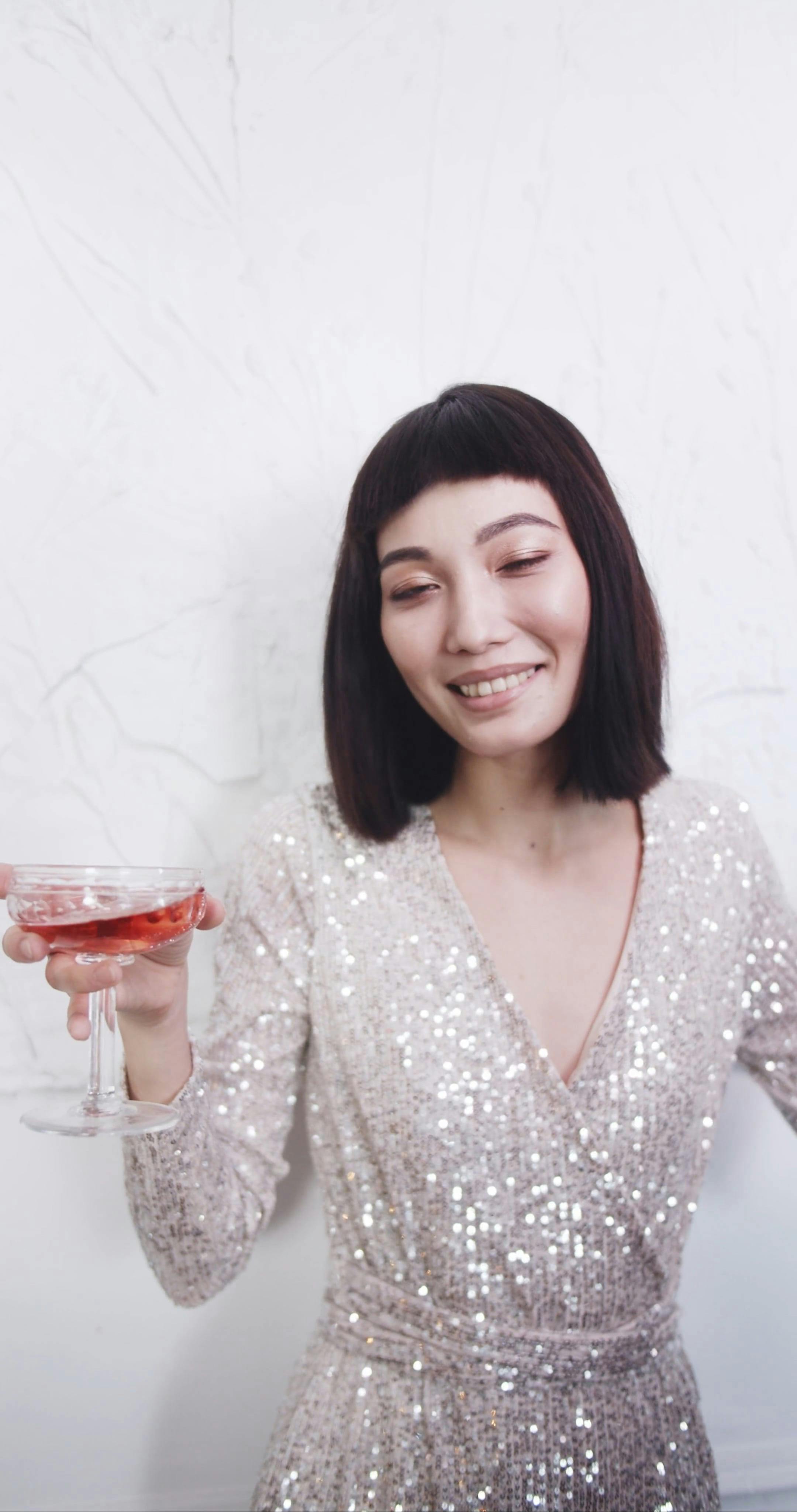 A Girl Tossing Her Glass With Friends In A Party · Free Stock Video