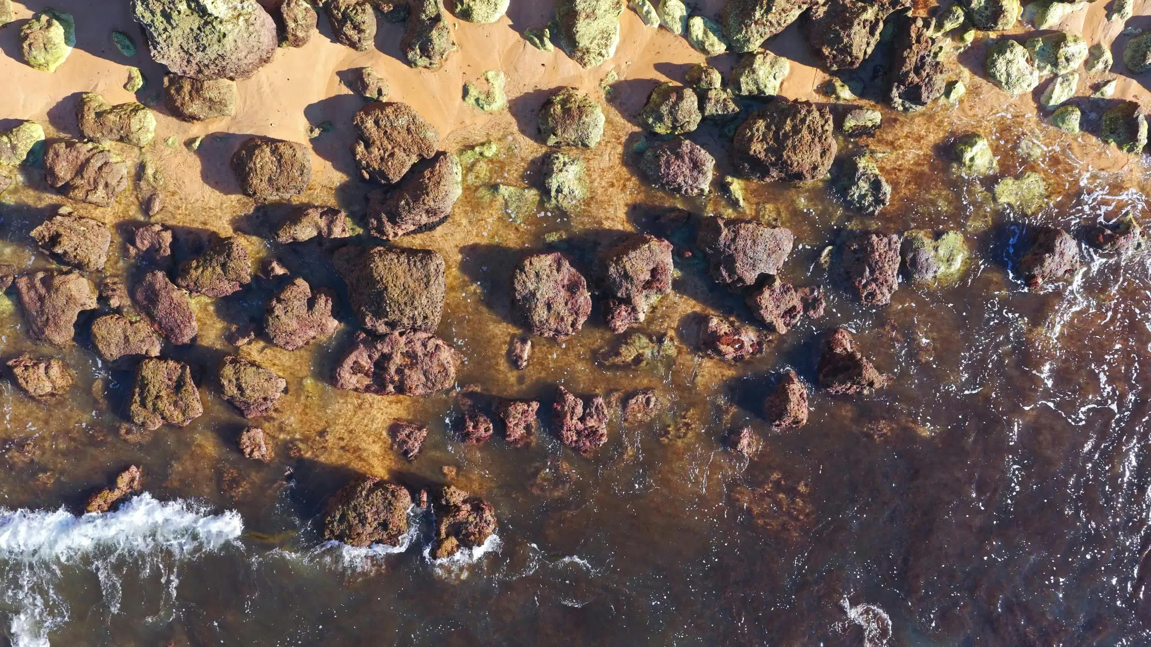 Aerial View of Rocky Ocean Shoreline at Daytime Free Stock Video ...
