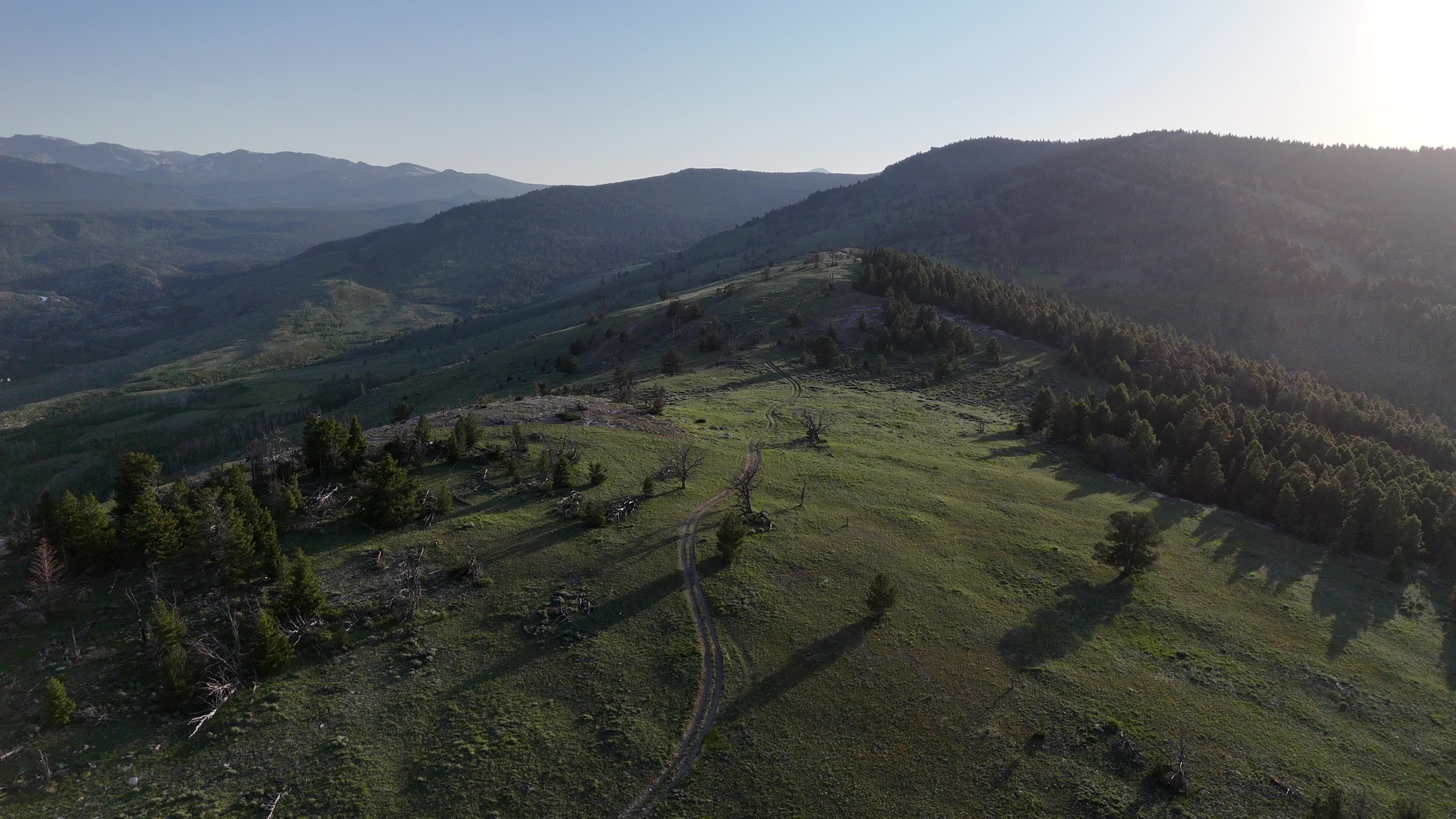 Aerial View of Scenic Mountain Trail at Sunset Free Stock Video Footage ...