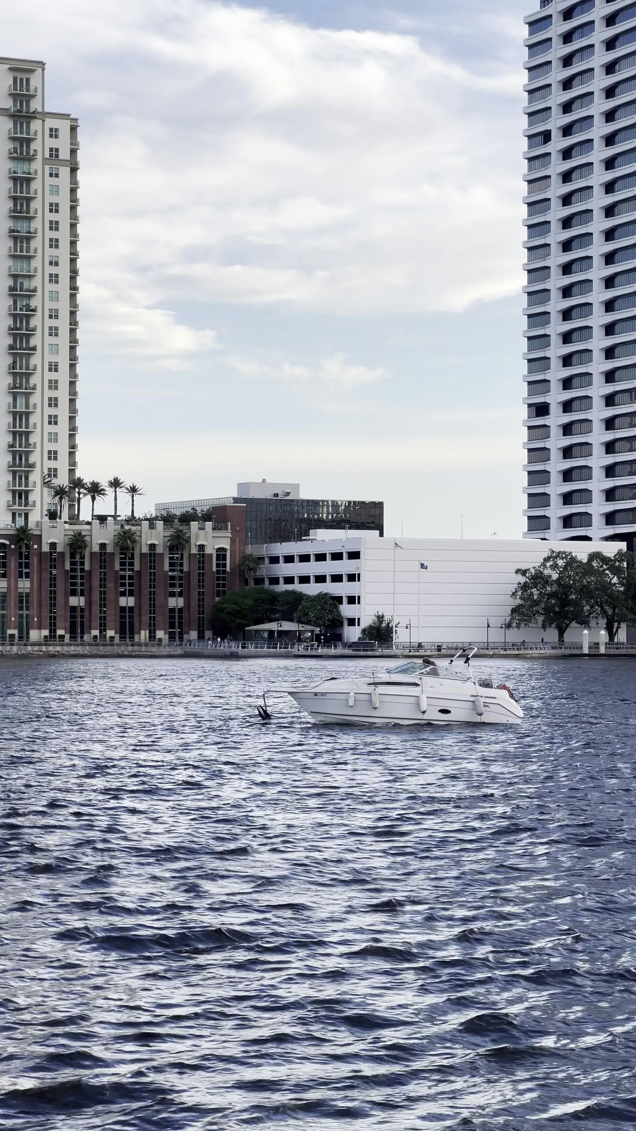 Serene Waterfront Cityscape with Yacht Free Stock Video Footage ...