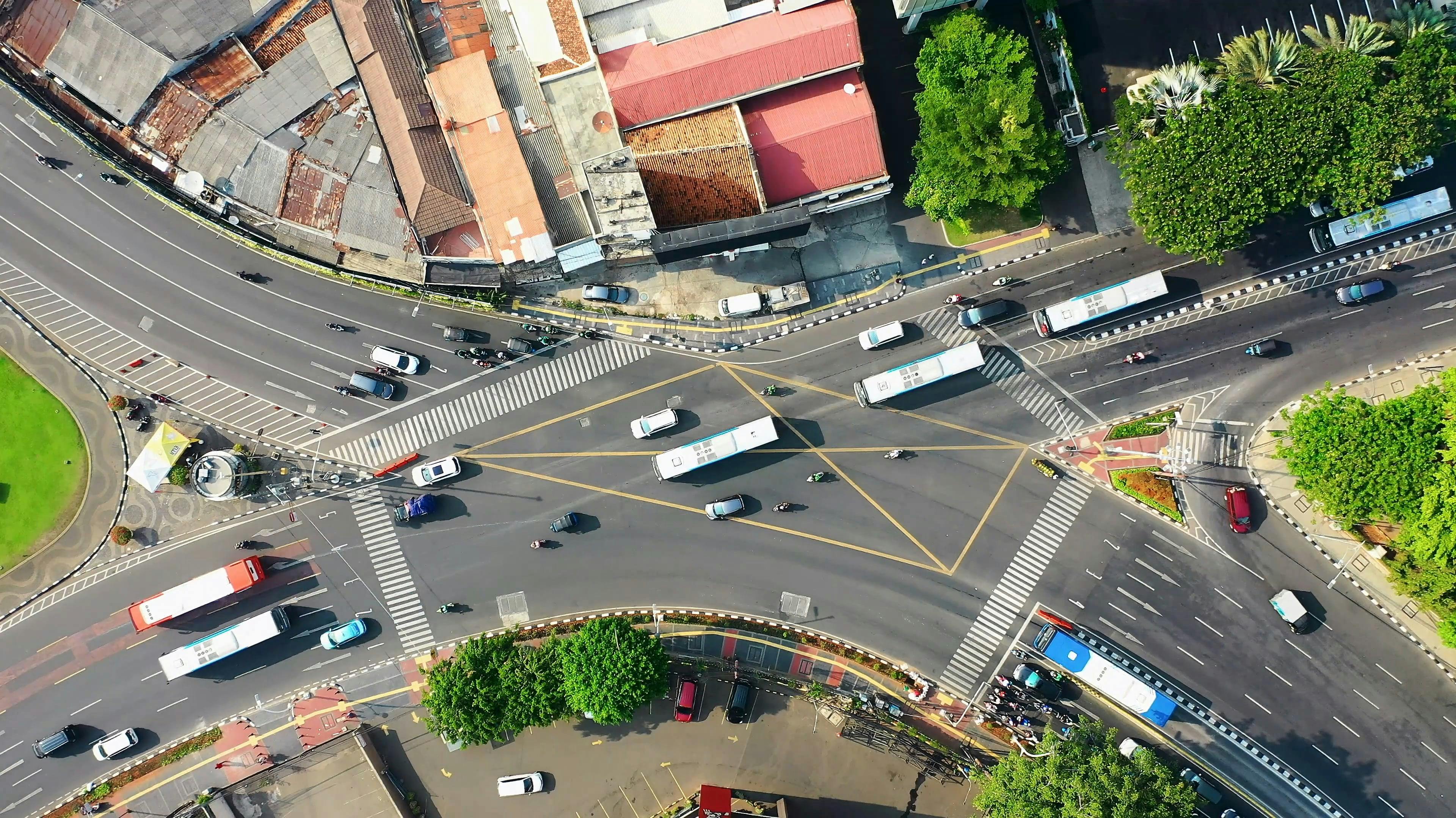 Motor Vehicles Traffic On An Intersecting Road · Free Stock Video