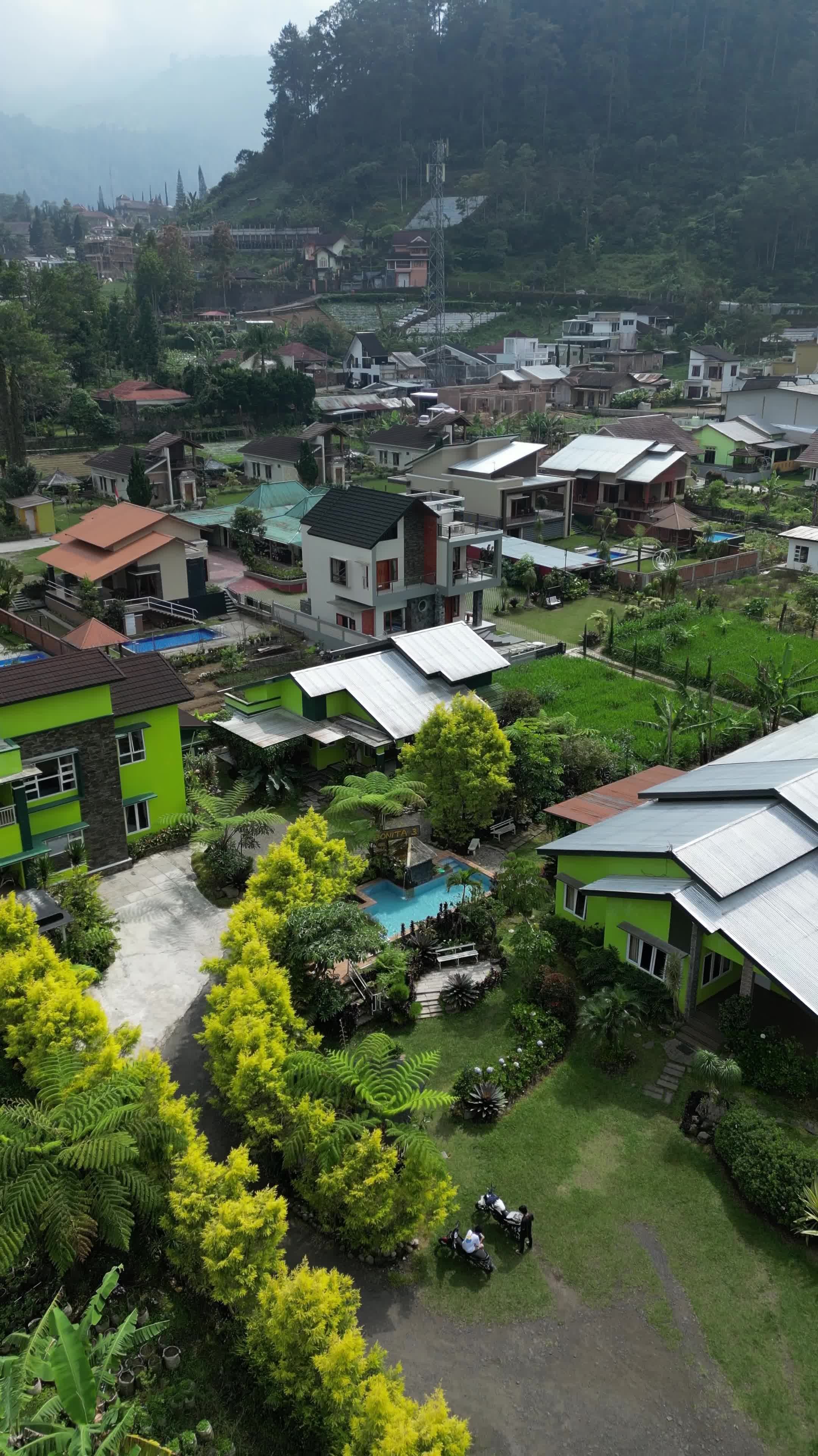 Aerial View of Lush Green Village and Mountain Free Stock Video Footage ...