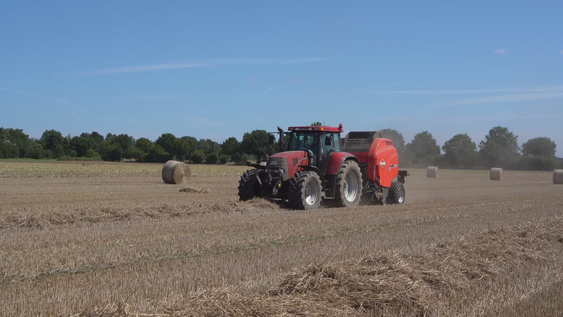 Modern Farming: Tractor Harvesting Hay Bales Free Stock Video Footage ...