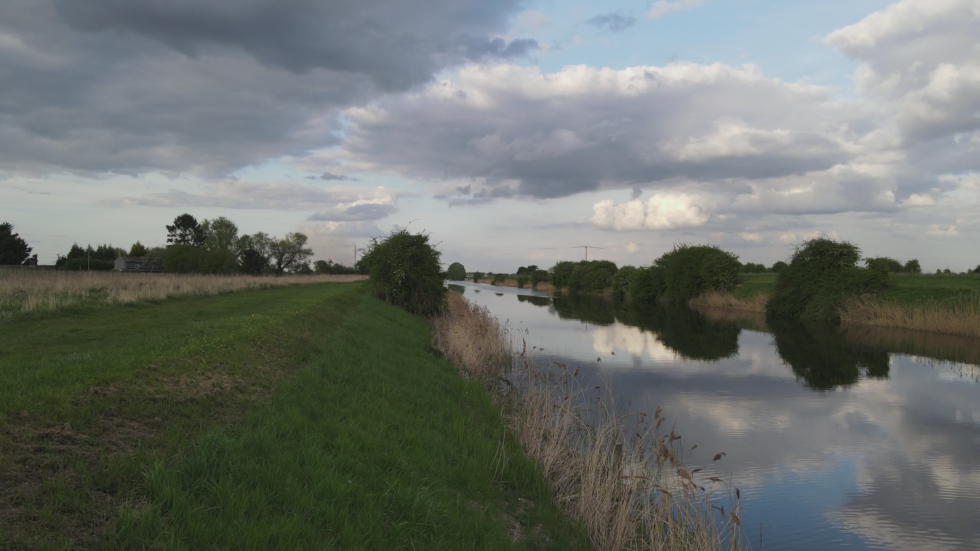 Scenic 4K Aerial View of a Serene Riverbank Free Stock Video Footage ...