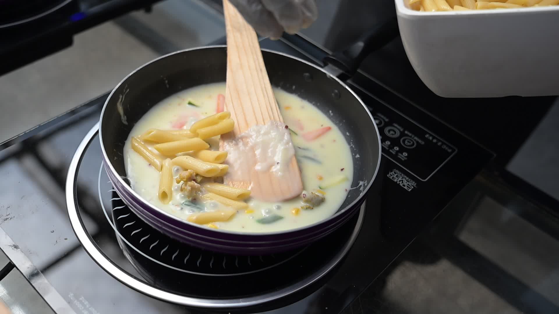Creamy Pasta Cooking on Induction Stove Free Stock Video Footage ...
