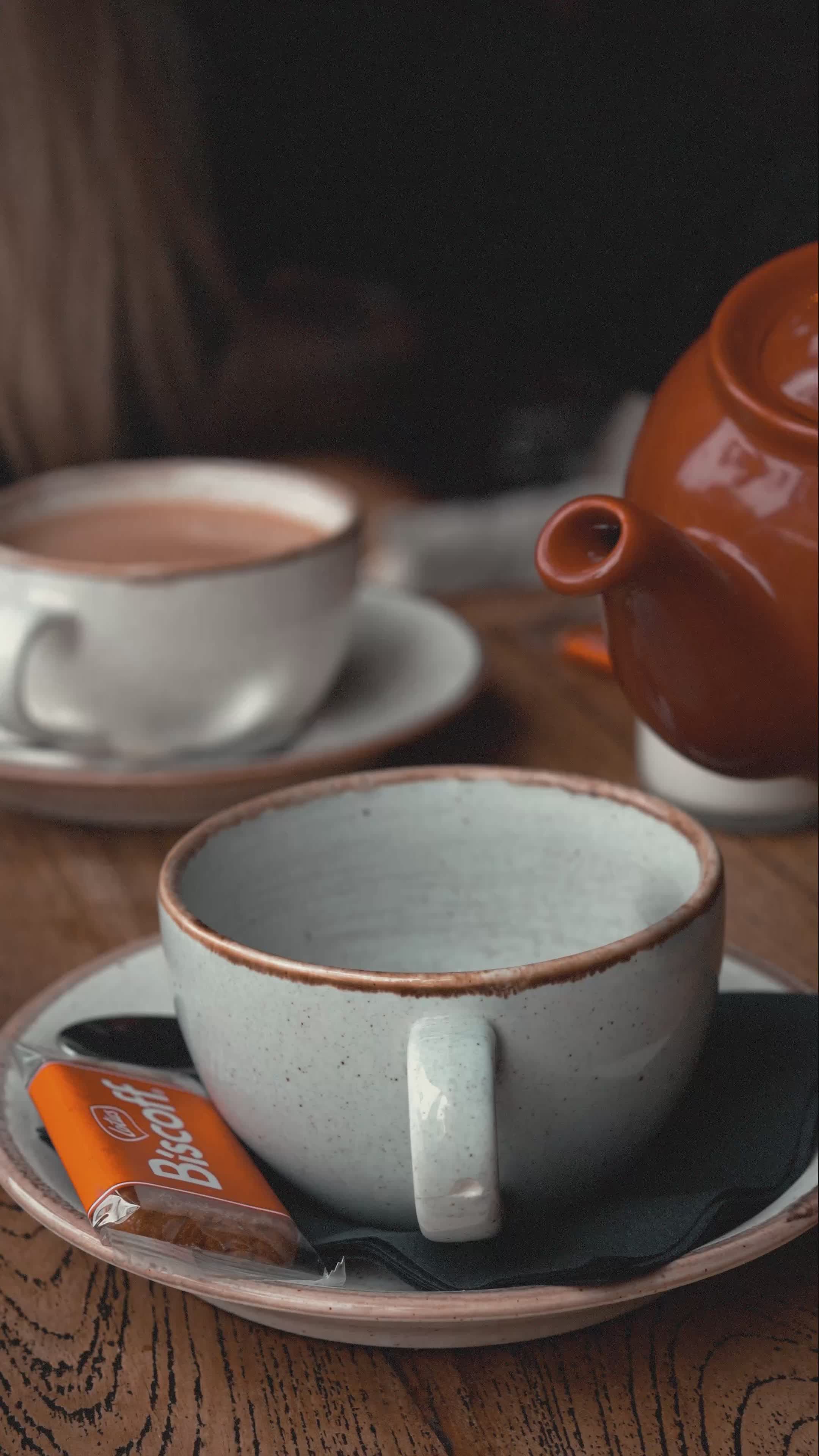 Cozy Cafe Scene with Tea Pouring in Autumn Free Stock Video Footage ...