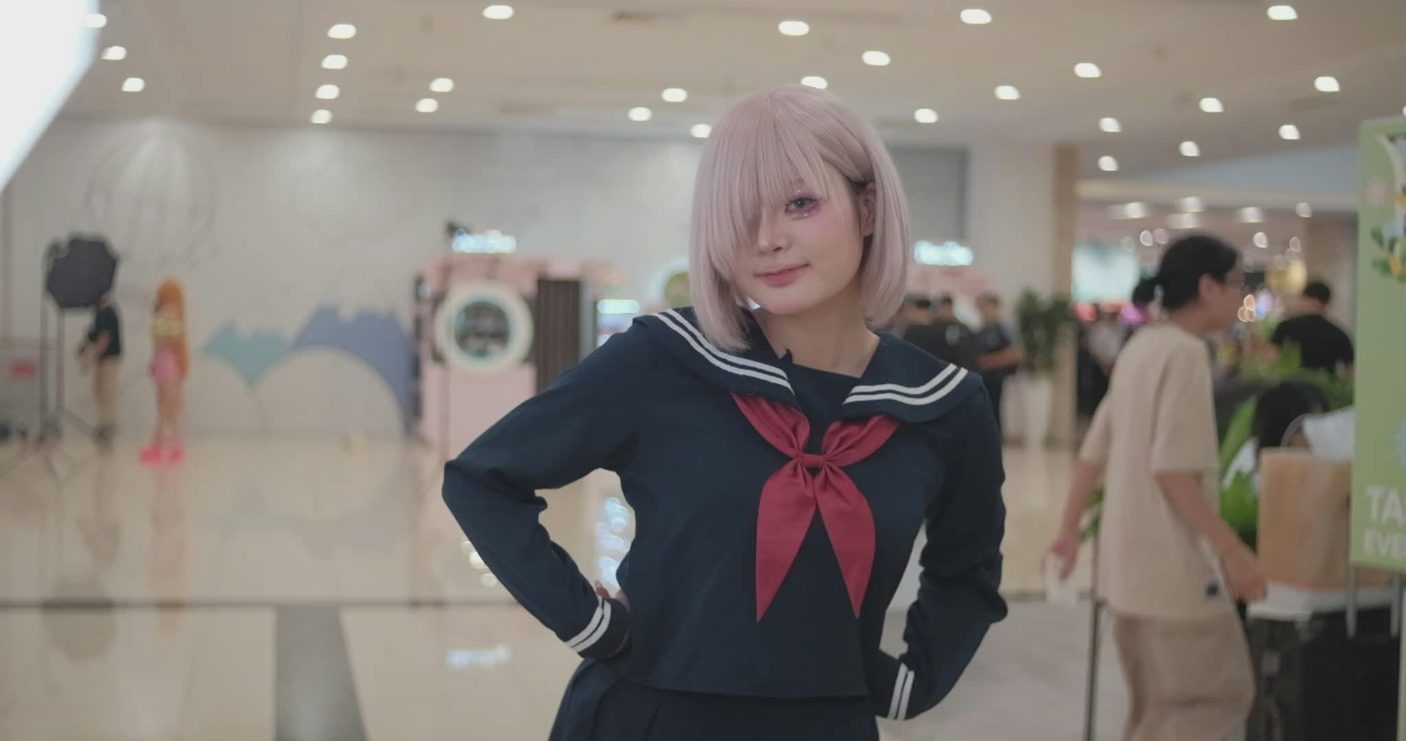 Cosplayer Posing in Sailor Uniform at Convention Free Stock Video ...