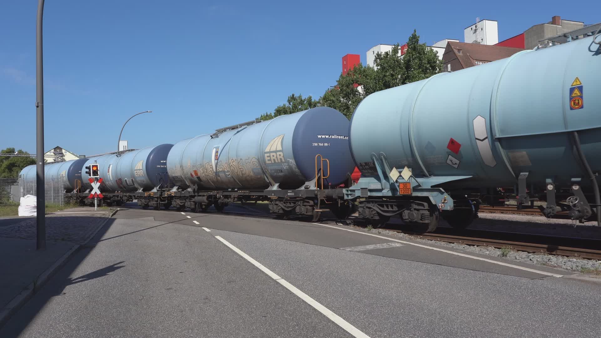 Cargo Train Passing Through Urban Crossroads Free Stock Video Footage ...