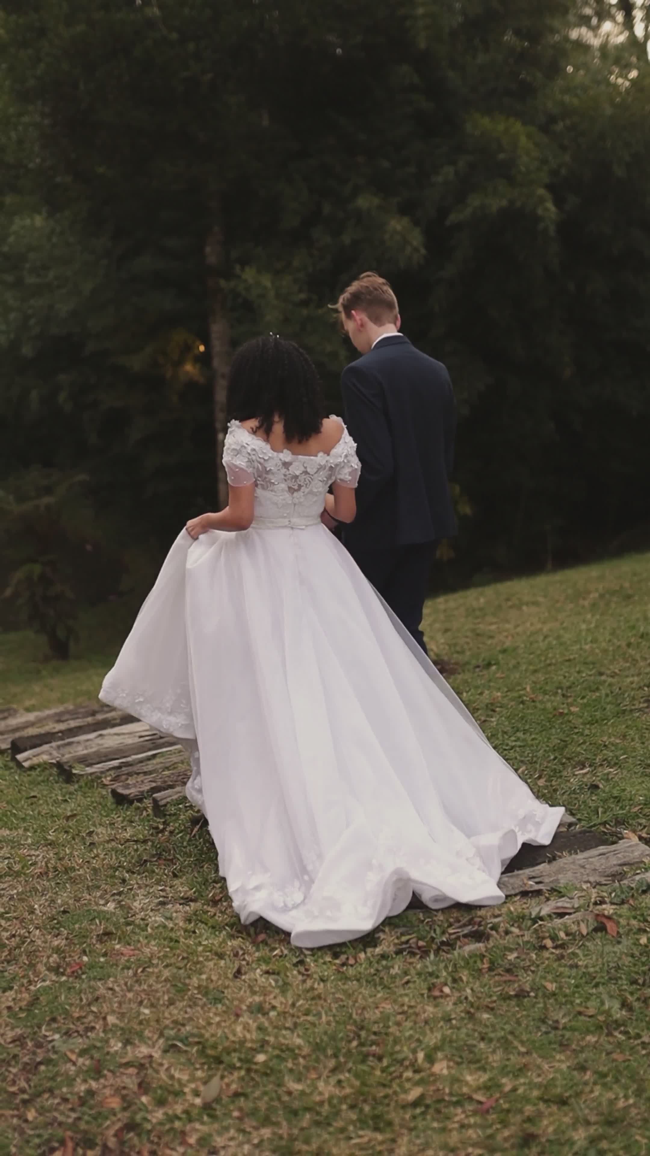 Elegant Outdoor Wedding Stroll Captured on Film Free Stock Video ...