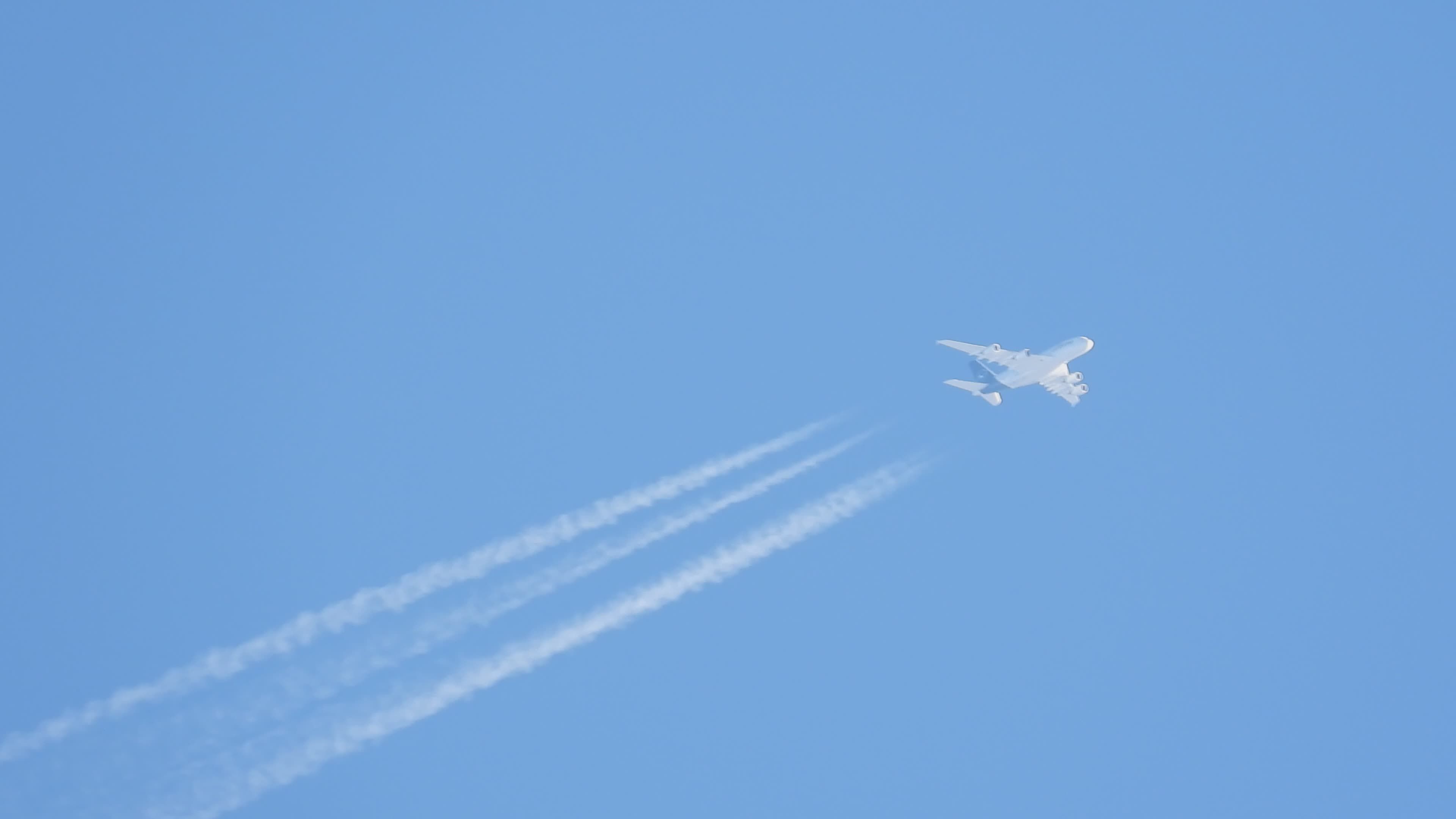 High Altitude Aircraft with Contrails in Blue Sky Free Stock Video ...