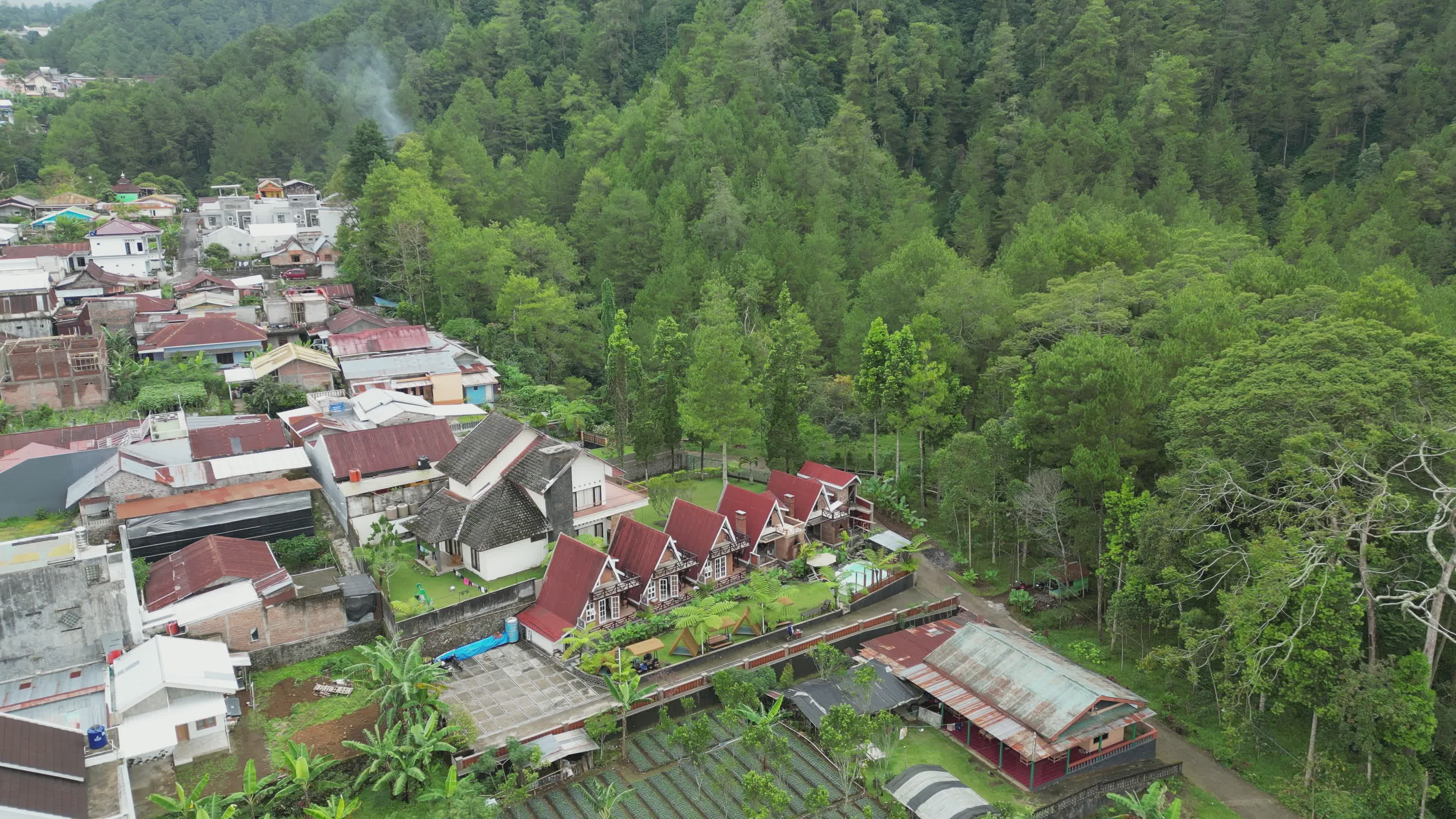 Aerial View of Rustic Village Houses and Forest Free Stock Video ...