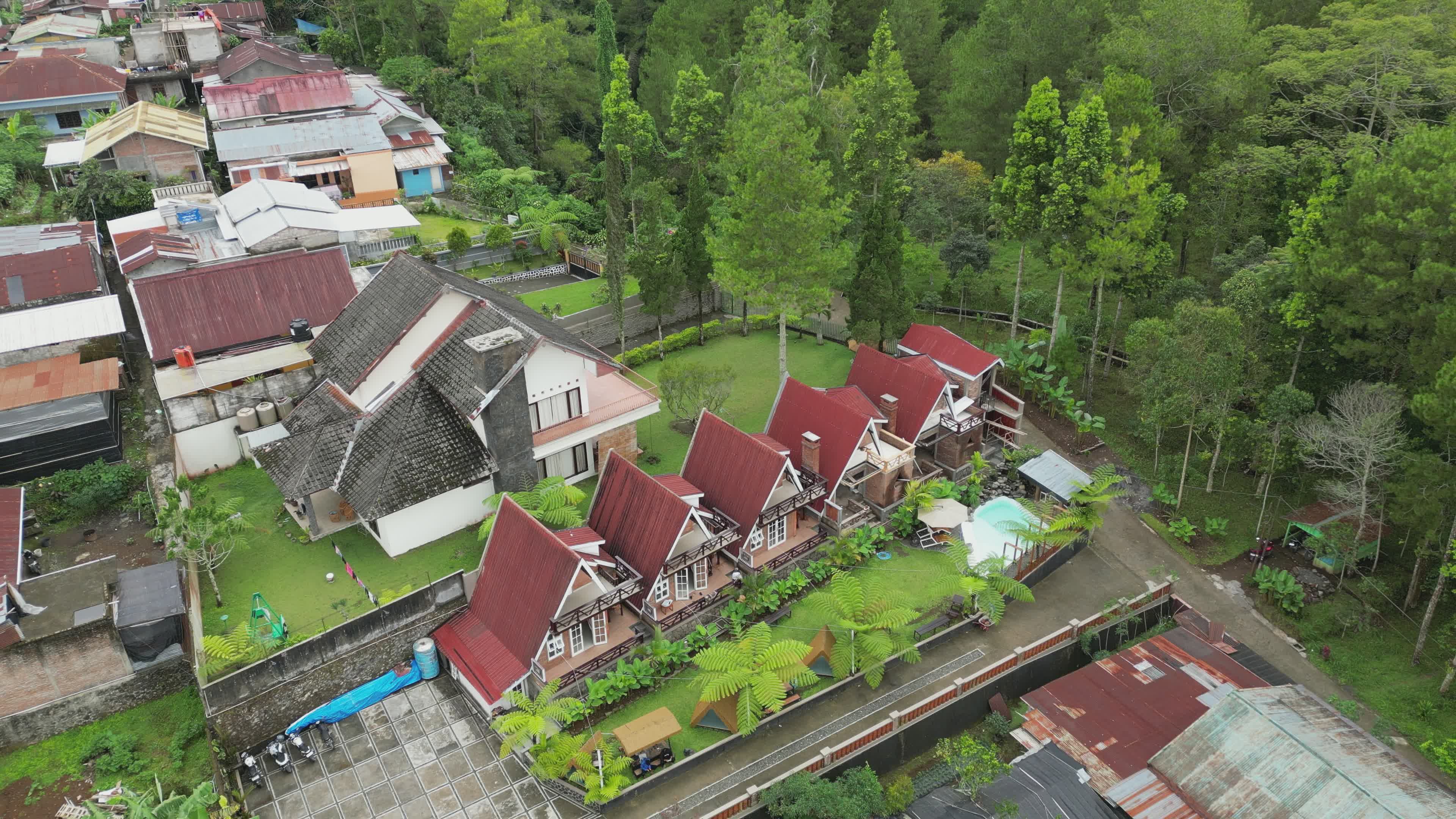 Scenic Aerial View of Rustic Village Cabins Free Stock Video Footage ...