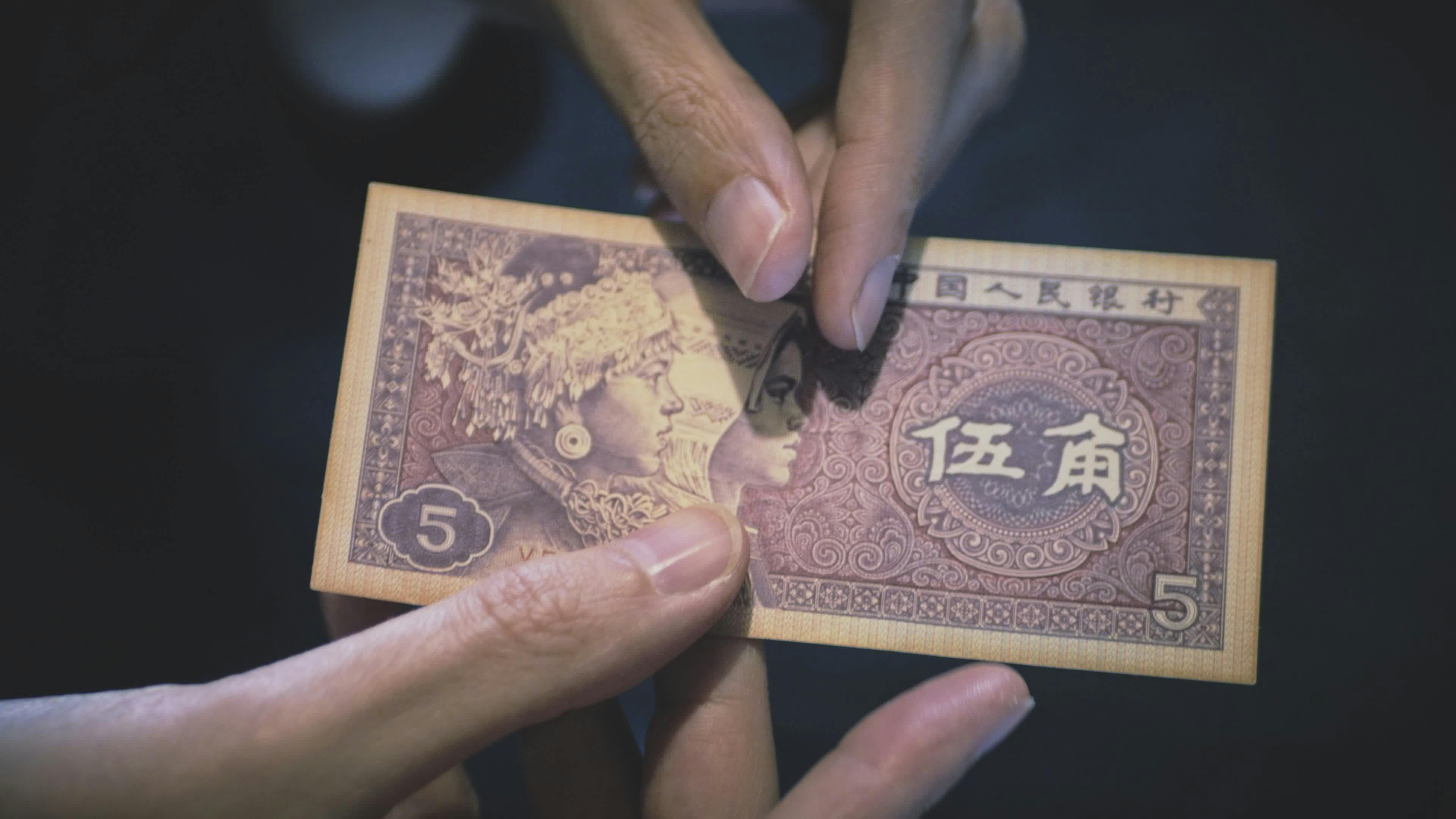 Close-up of Hands Holding Chinese 5 Jiao Note Free Stock Video Footage ...