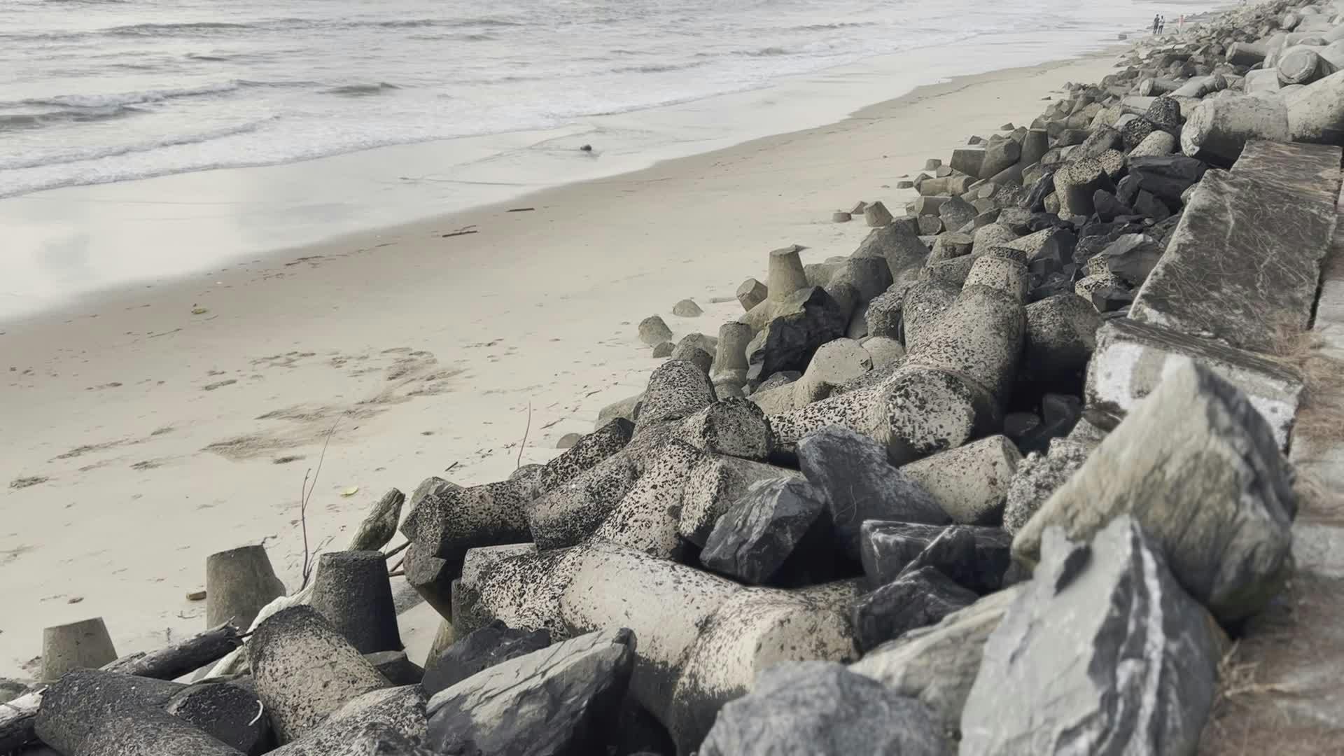Coastal Breakwater Rocks on a Serene Beach Free Stock Video Footage ...