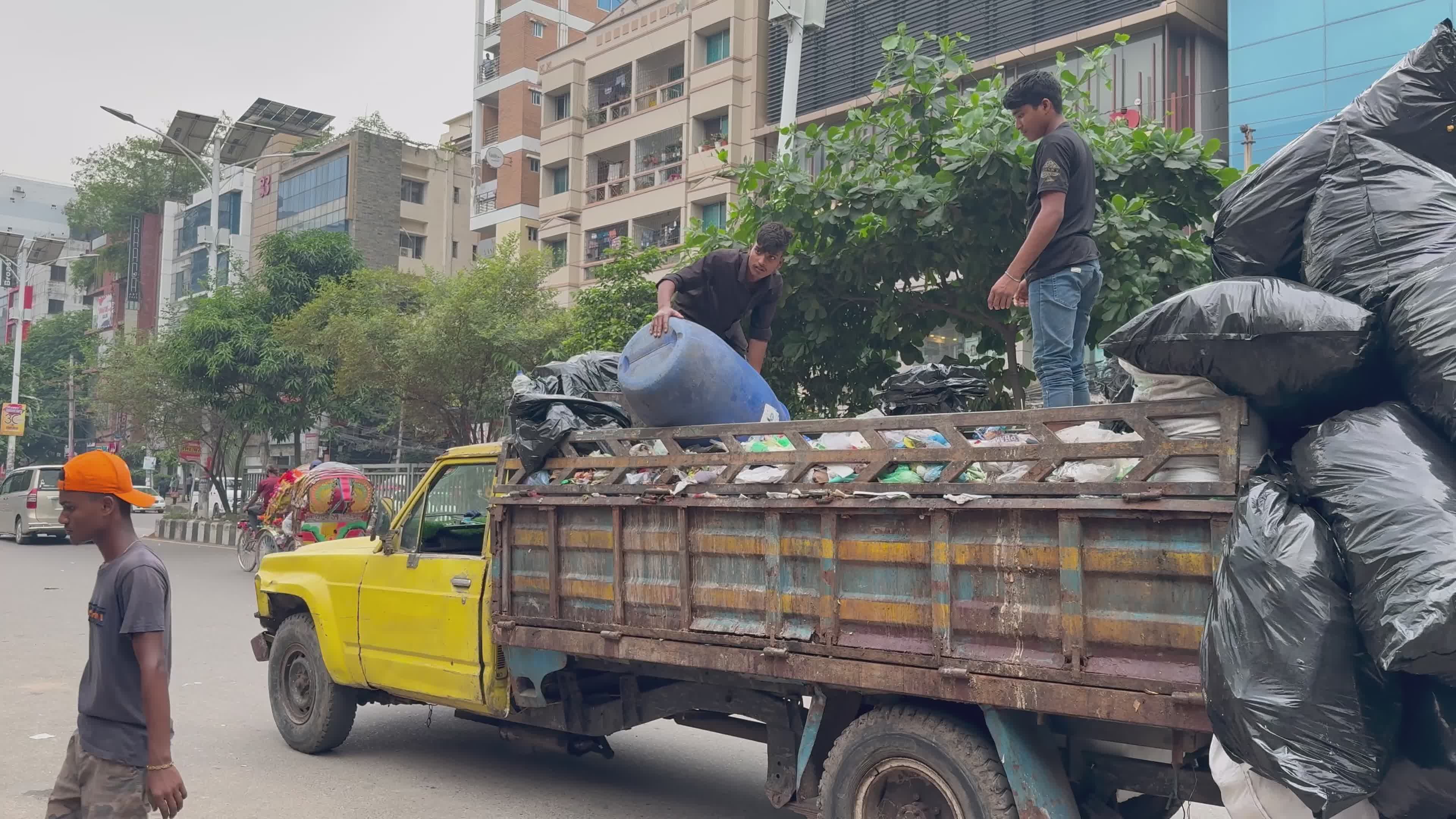 Urban Waste Management: Workers Loading Garbage Free Stock Video ...