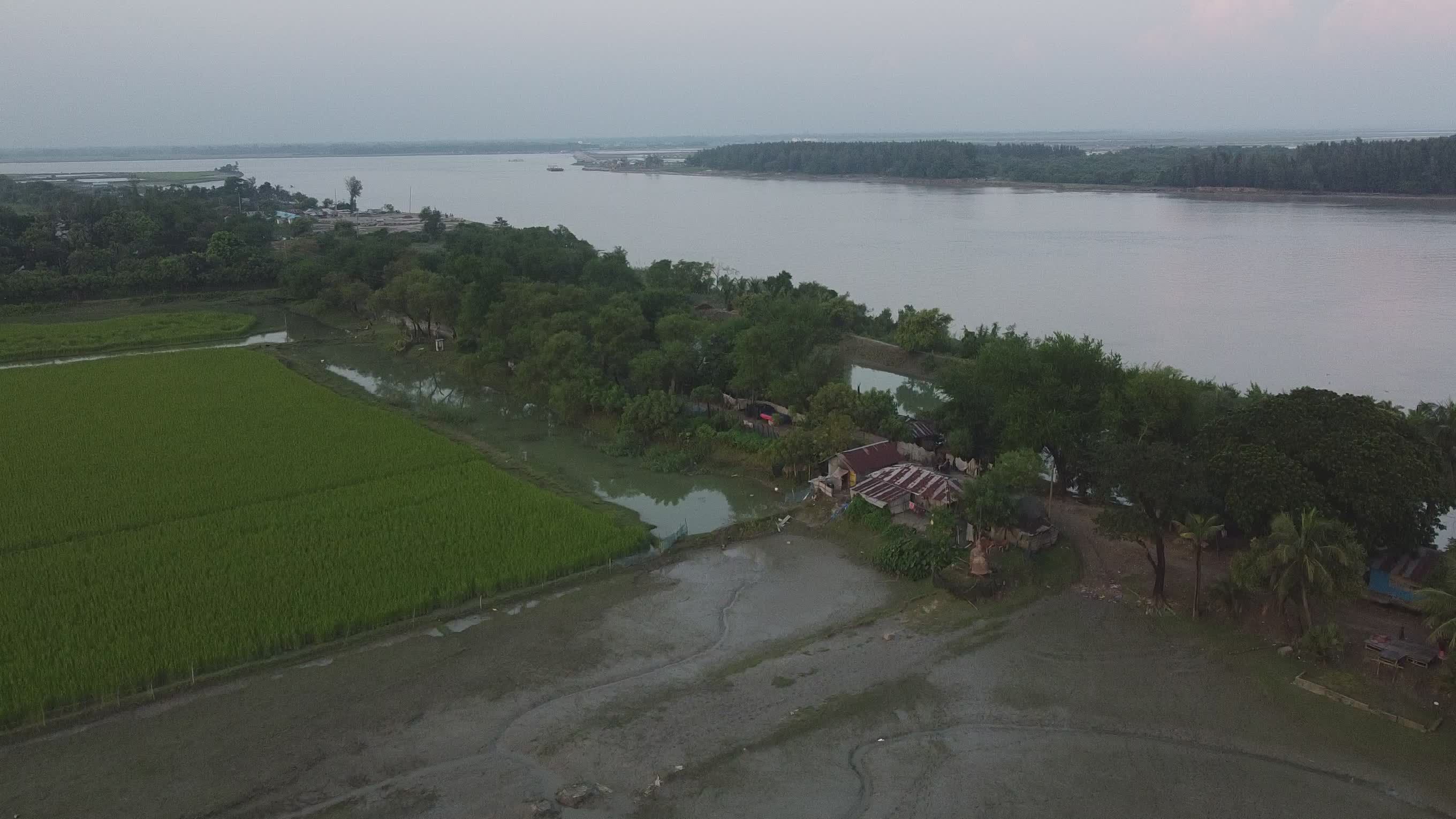 Aerial View of Riverside with Lush Greenery Free Stock Video Footage ...