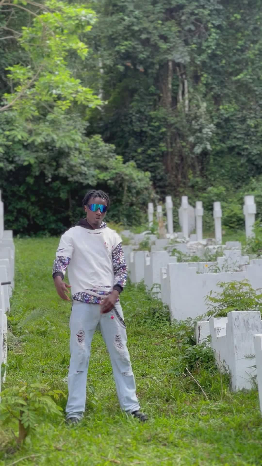 Man Dancing in a Cemetery Surrounded by Nature Free Stock Video Footage ...