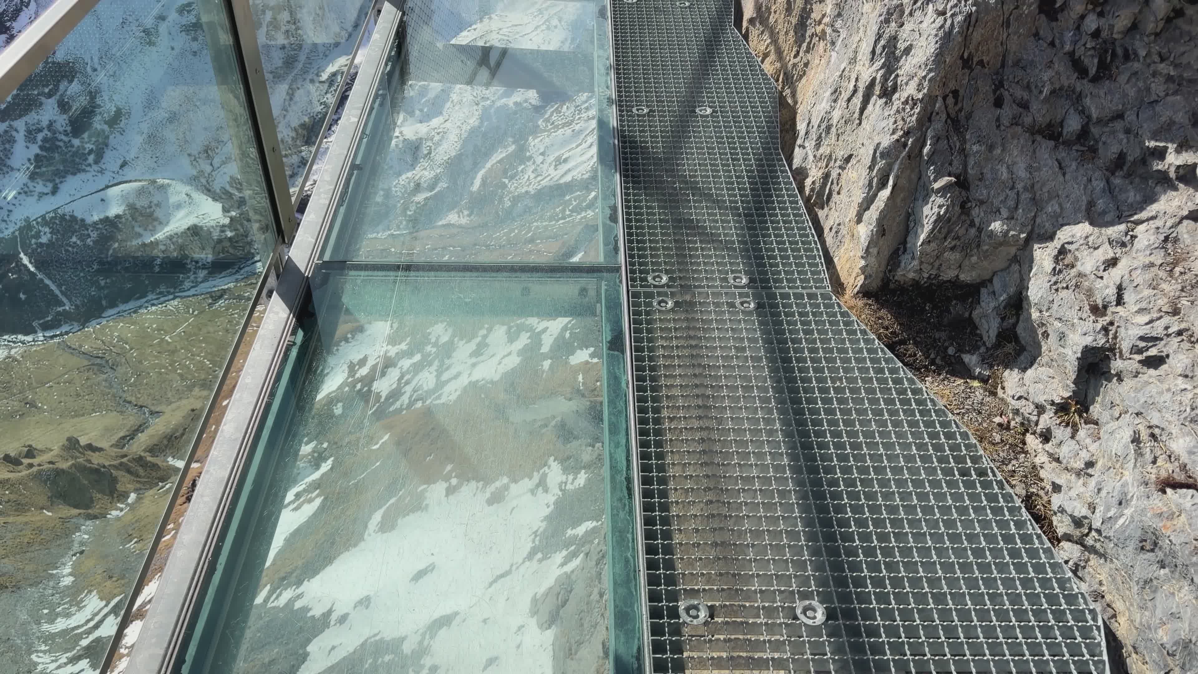 Alpine Cliffside View Overlooking Snowy Mountains Free Stock Video ...