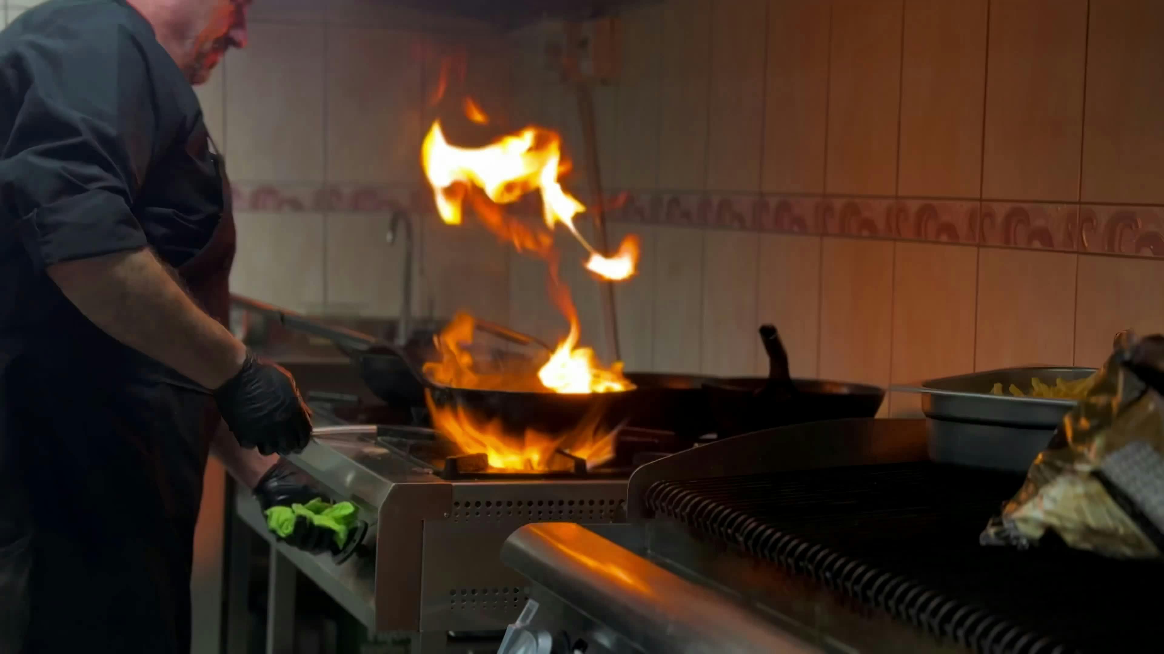 Professional Chef Flambé Cooking in Restaurant Kitchen Free Stock Video ...