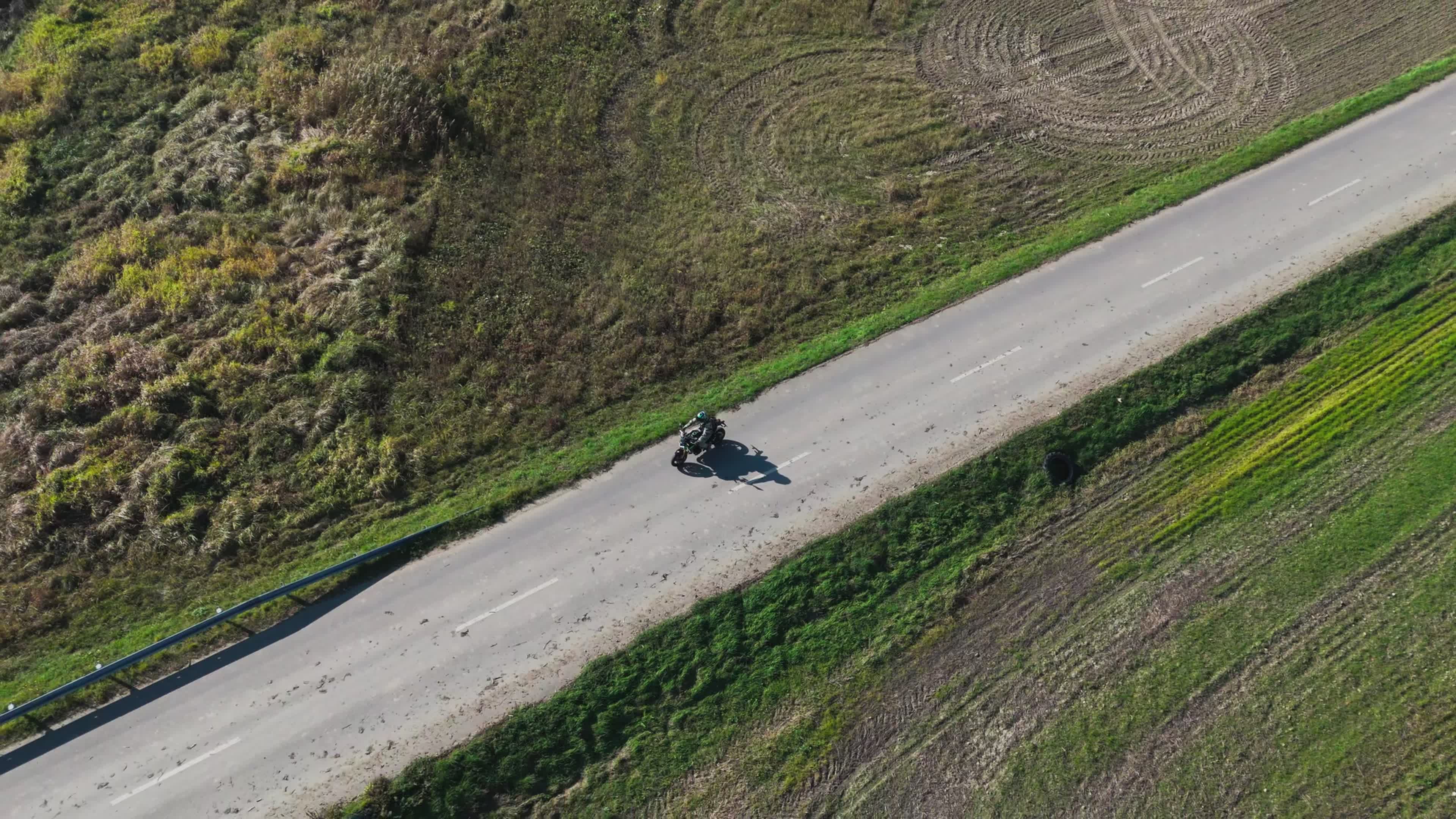 Aerial View of Motorcycle Journey on Rural Road Free Stock Video ...