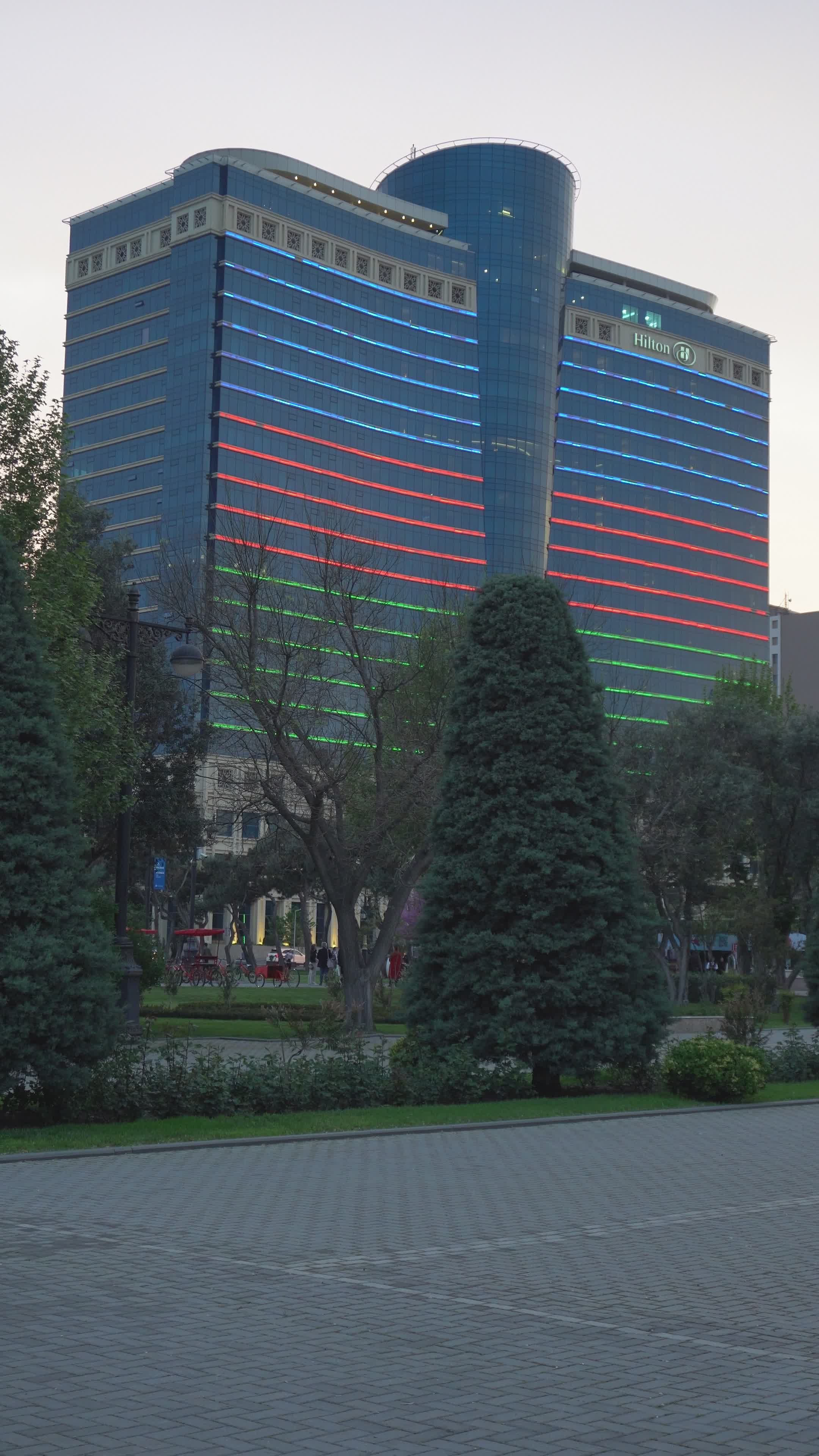 Colorful High-Rise Building Surrounded by Trees Free Stock Video ...