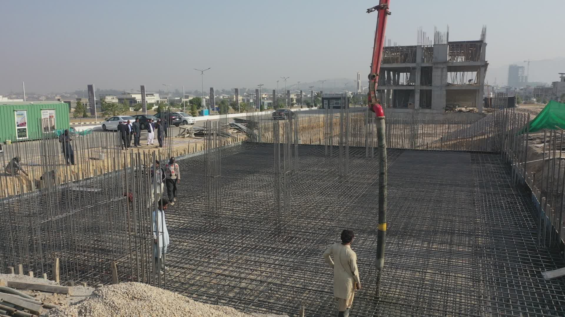 Construction Site with Workers Pouring Concrete Free Stock Video ...