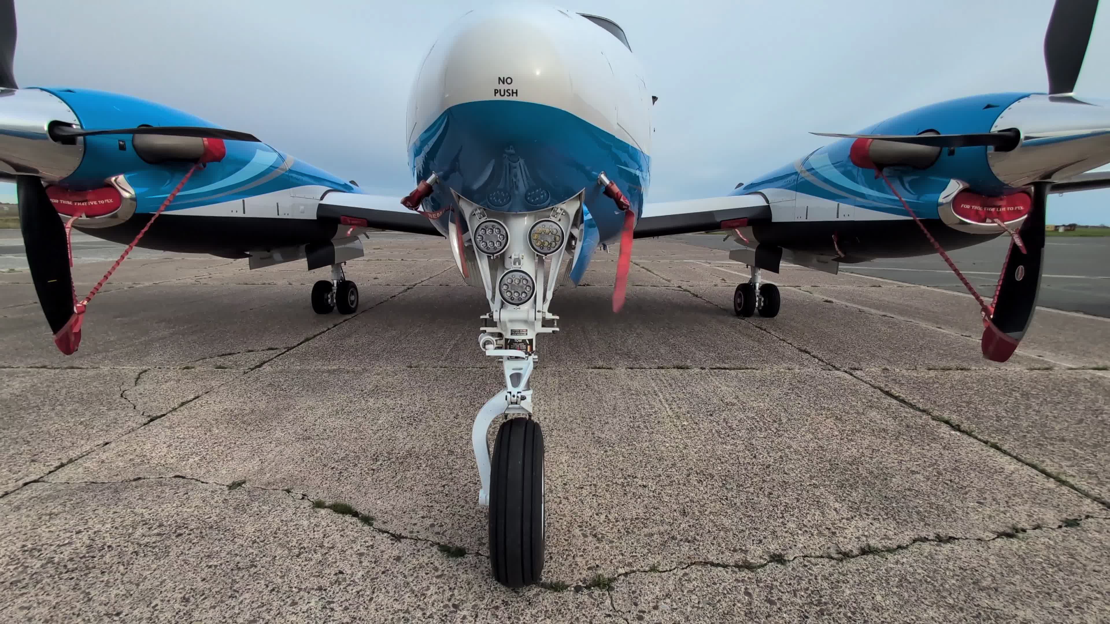 Front View of Twin Propeller Aircraft on Runway Free Stock Video ...