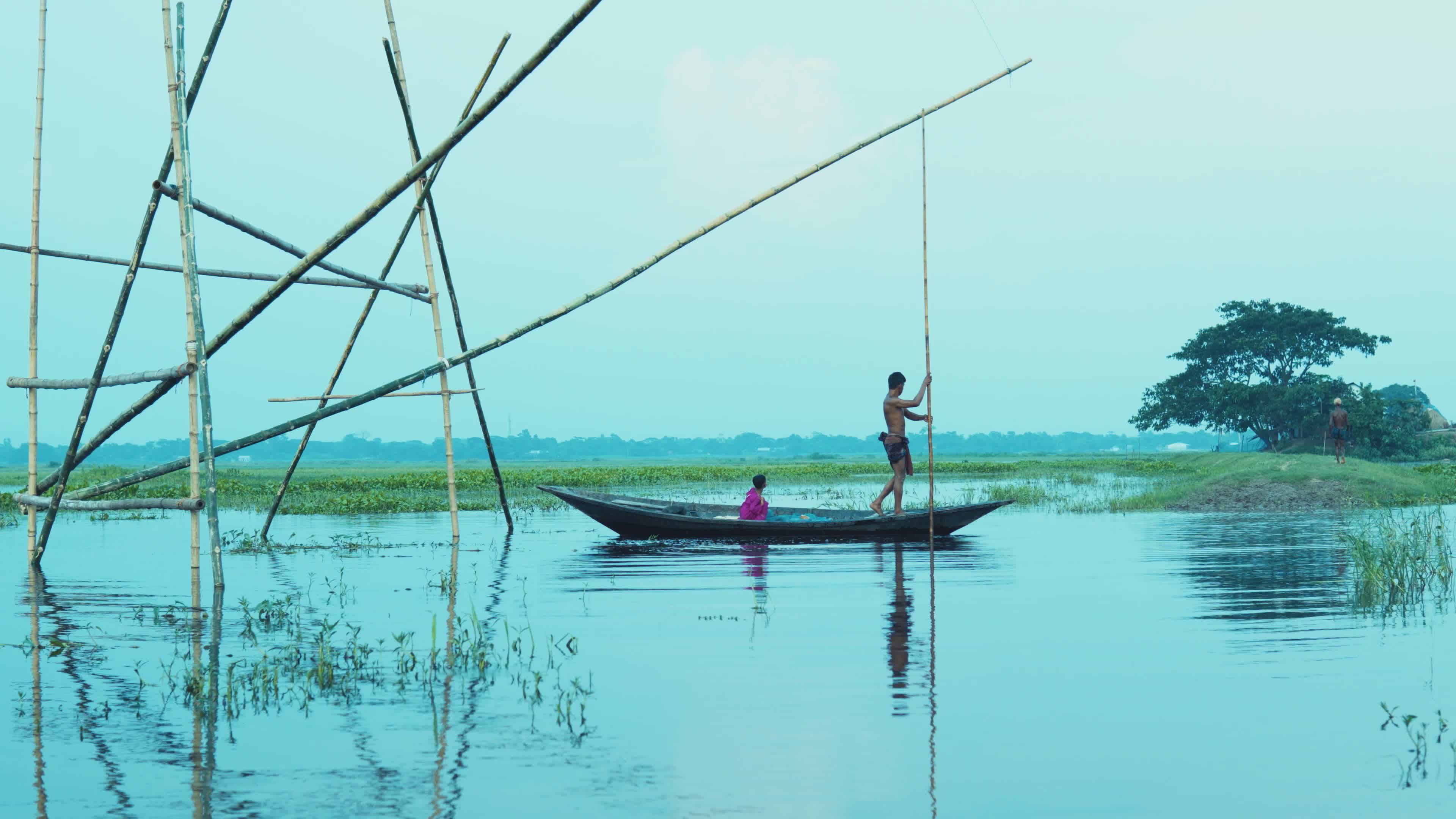 Traditional Fishing in Serene Rural Landscape Free Stock Video Footage ...