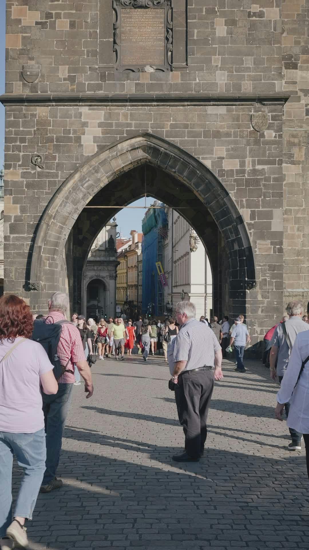 Crowds Strolling Through Gothic Archway Free Stock Video Footage ...