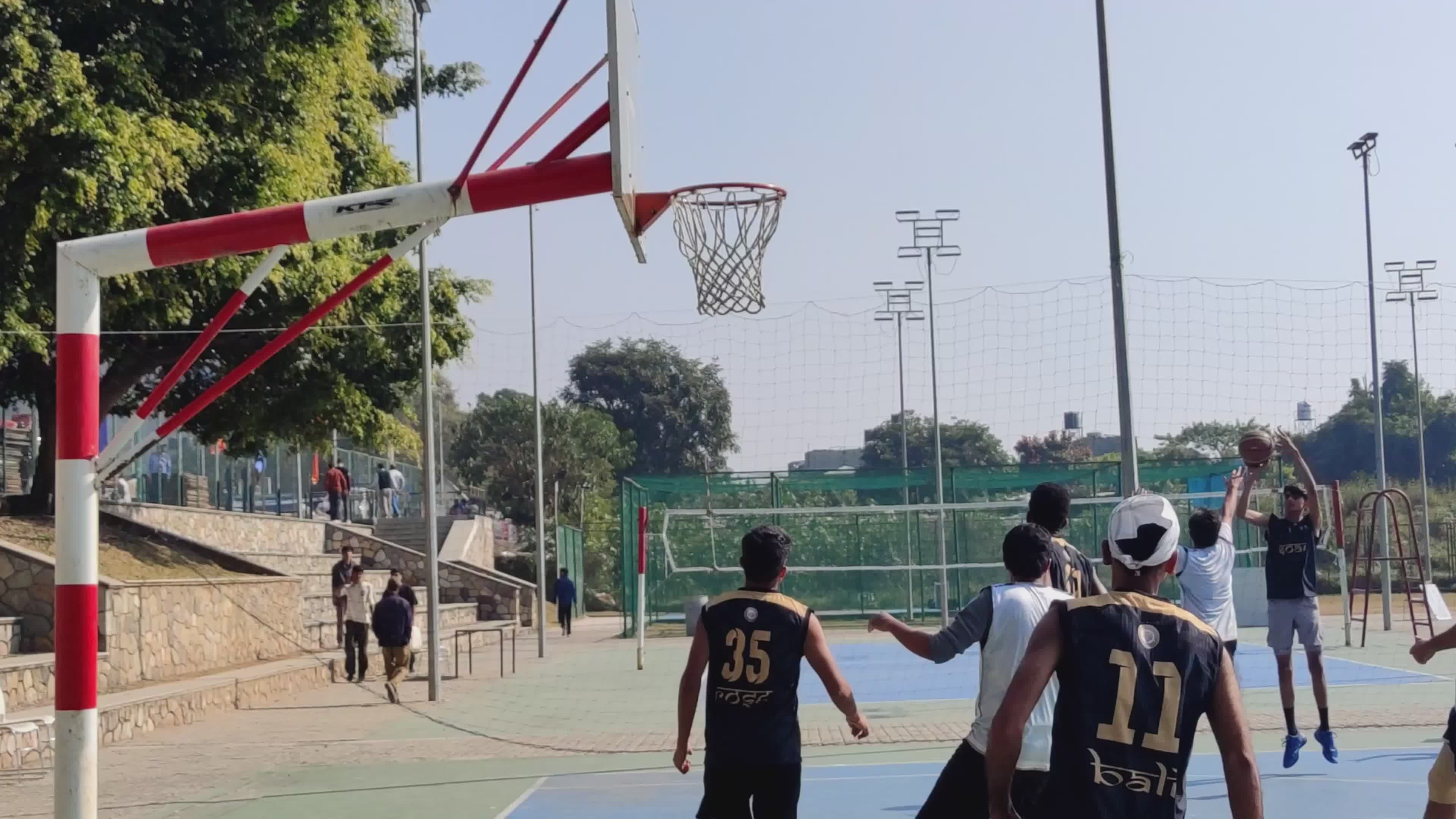 Dynamic Outdoor Basketball Match in Action Free Stock Video Footage ...