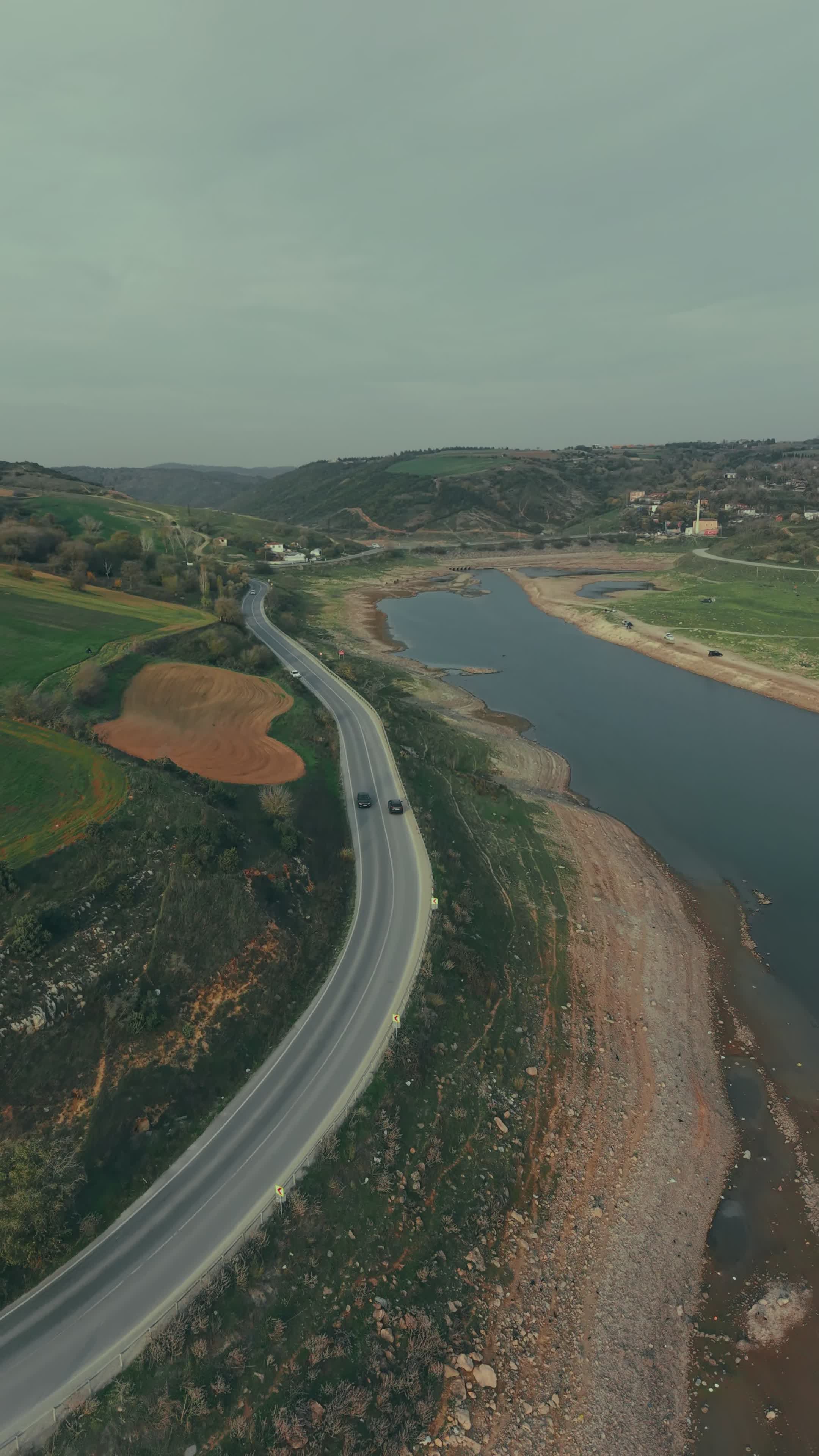 Scenic Drone Footage of Rural Road by River Free Stock Video Footage ...