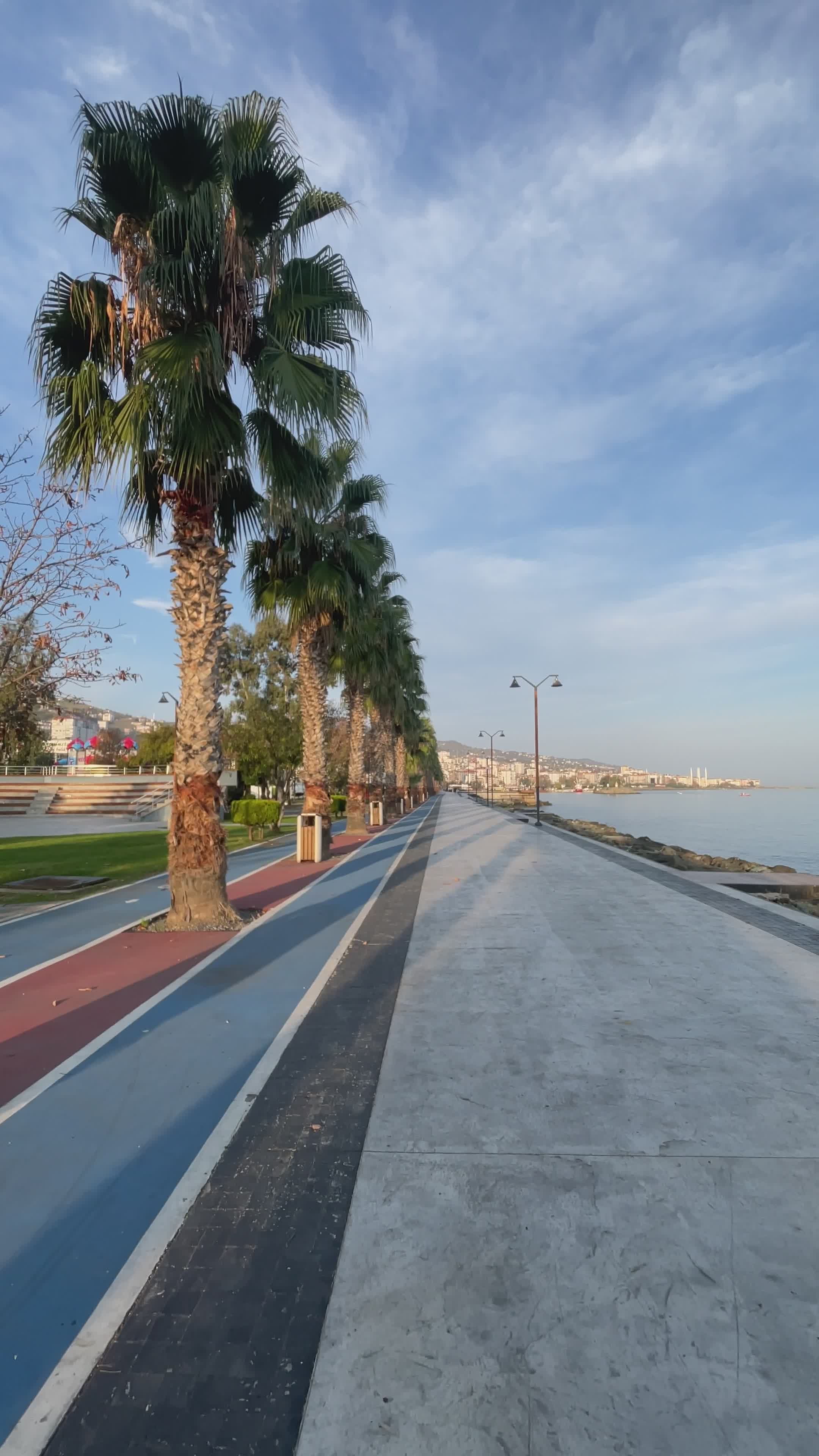 Scenic Coastal Promenade under Blue Skies Free Stock Video Footage ...