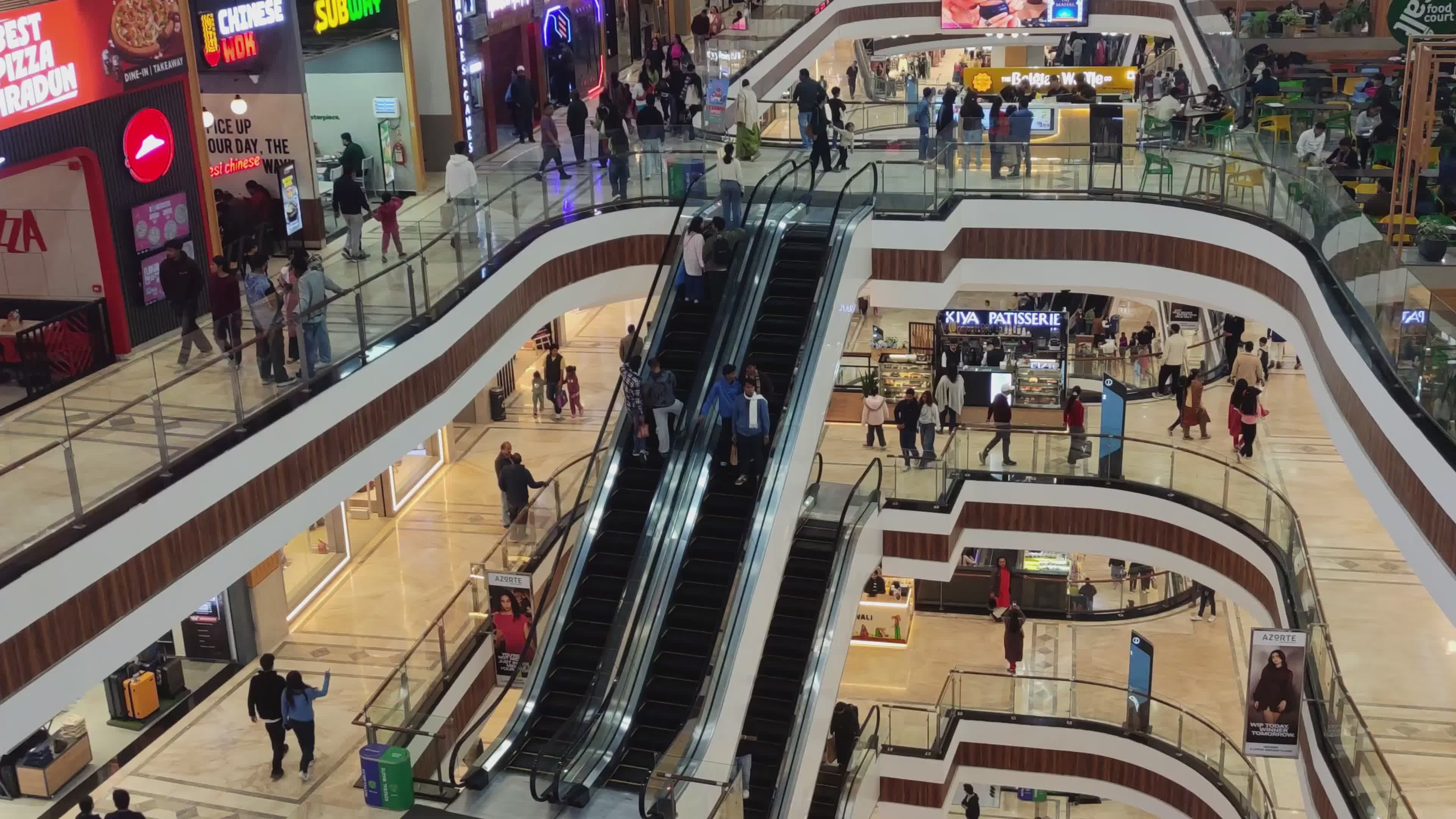 Vibrant Shopping Mall Interior with Escalators Free Stock Video Footage ...