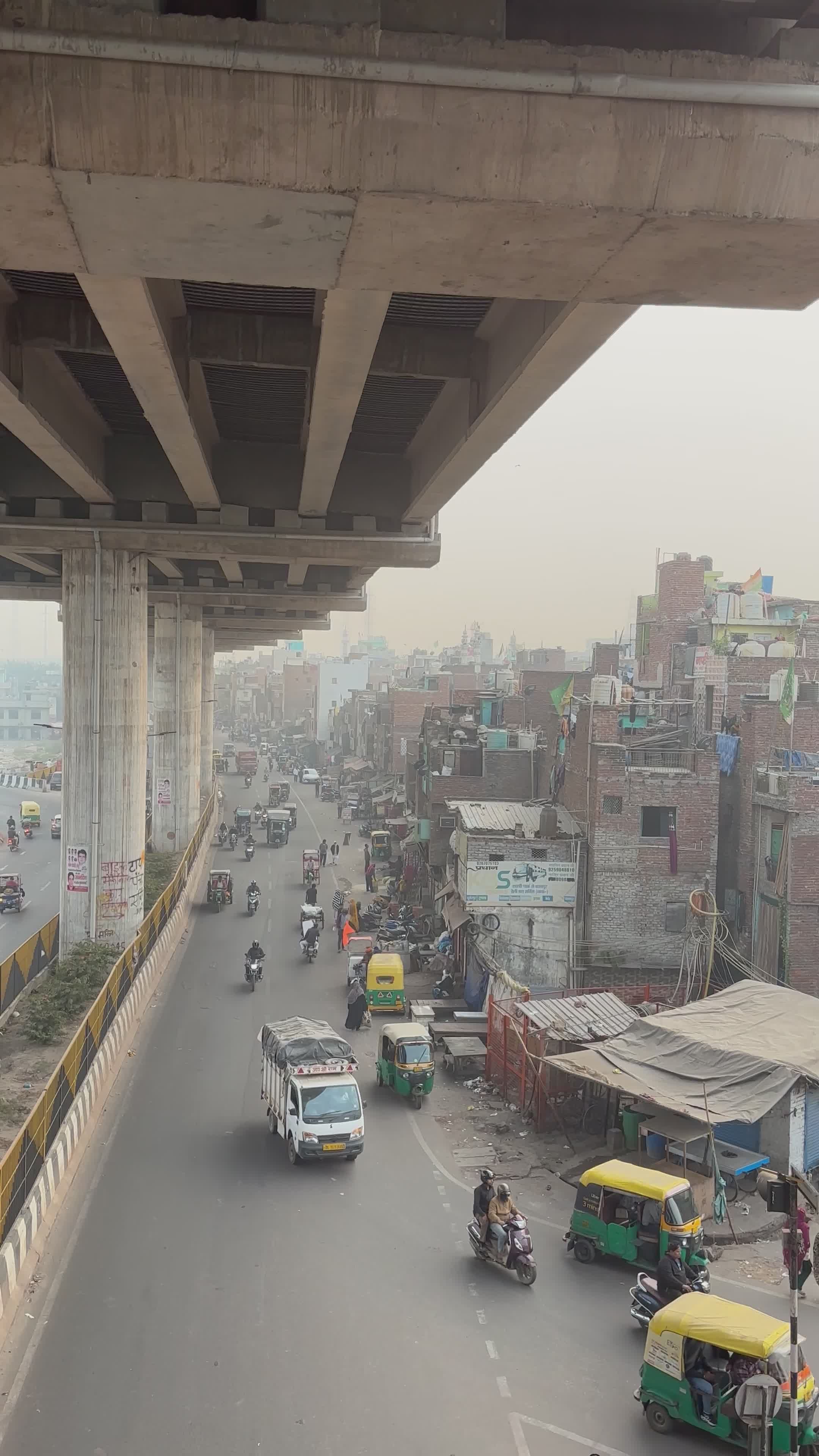 Bustling Indian City Street Under Overpass Free Stock Video Footage ...