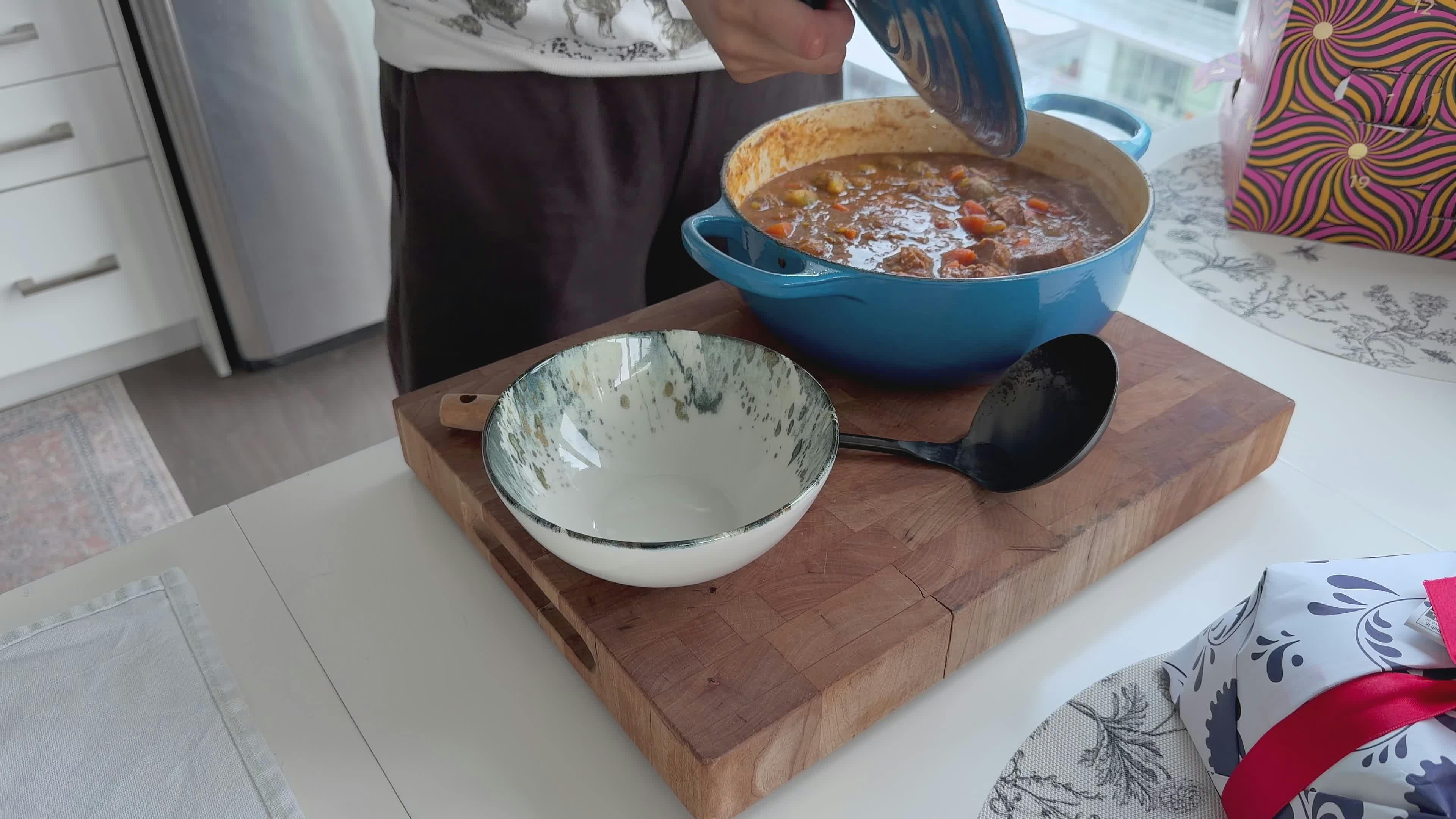 Home Cooking: Serving Hearty Stew in Kitchen Free Stock Video Footage ...