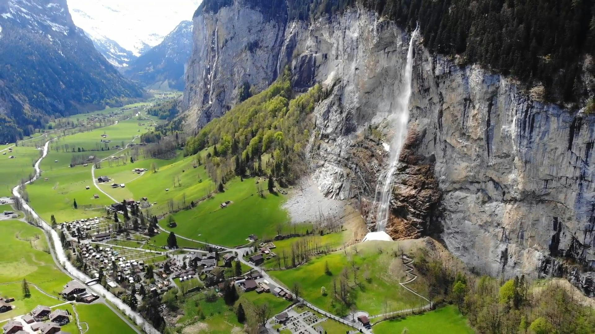 Aerial Footage Of A Village Built In A Valley Between Mountains · Free ...