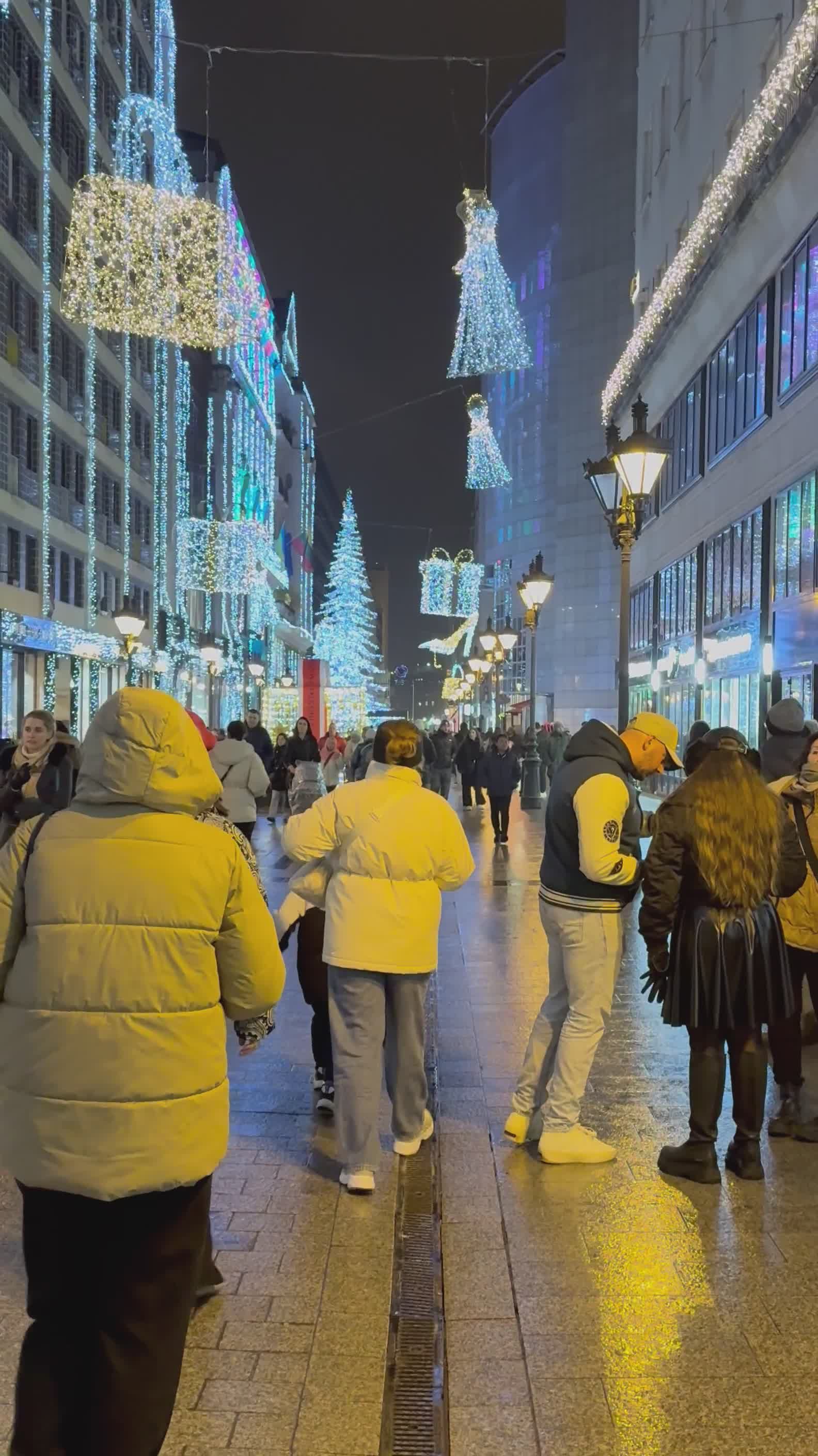 Festive Night Stroll in Illuminated City Street Free Stock Video ...
