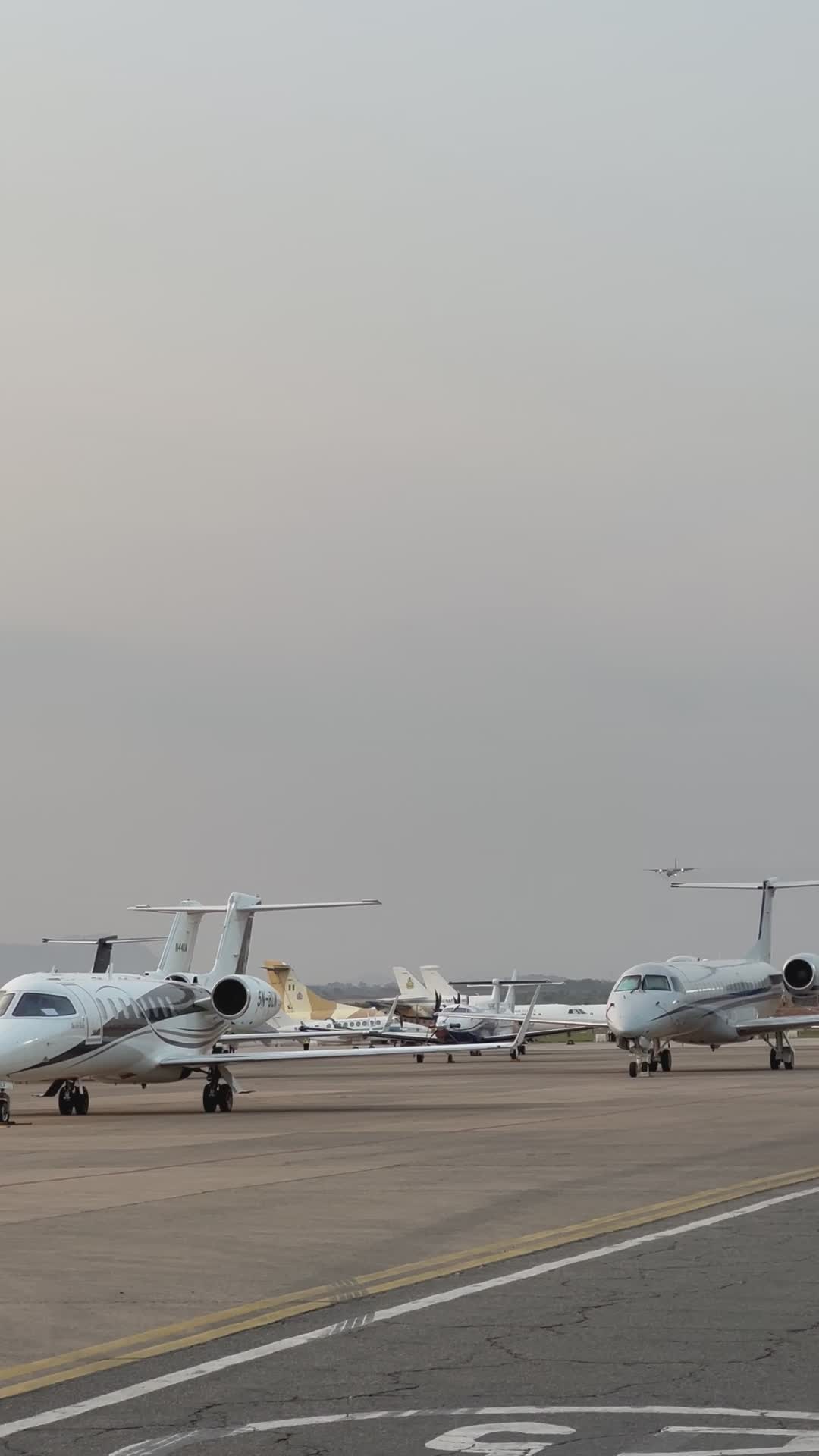 Private Jets and Shuttle Bus on Airport Tarmac Free Stock Video Footage ...