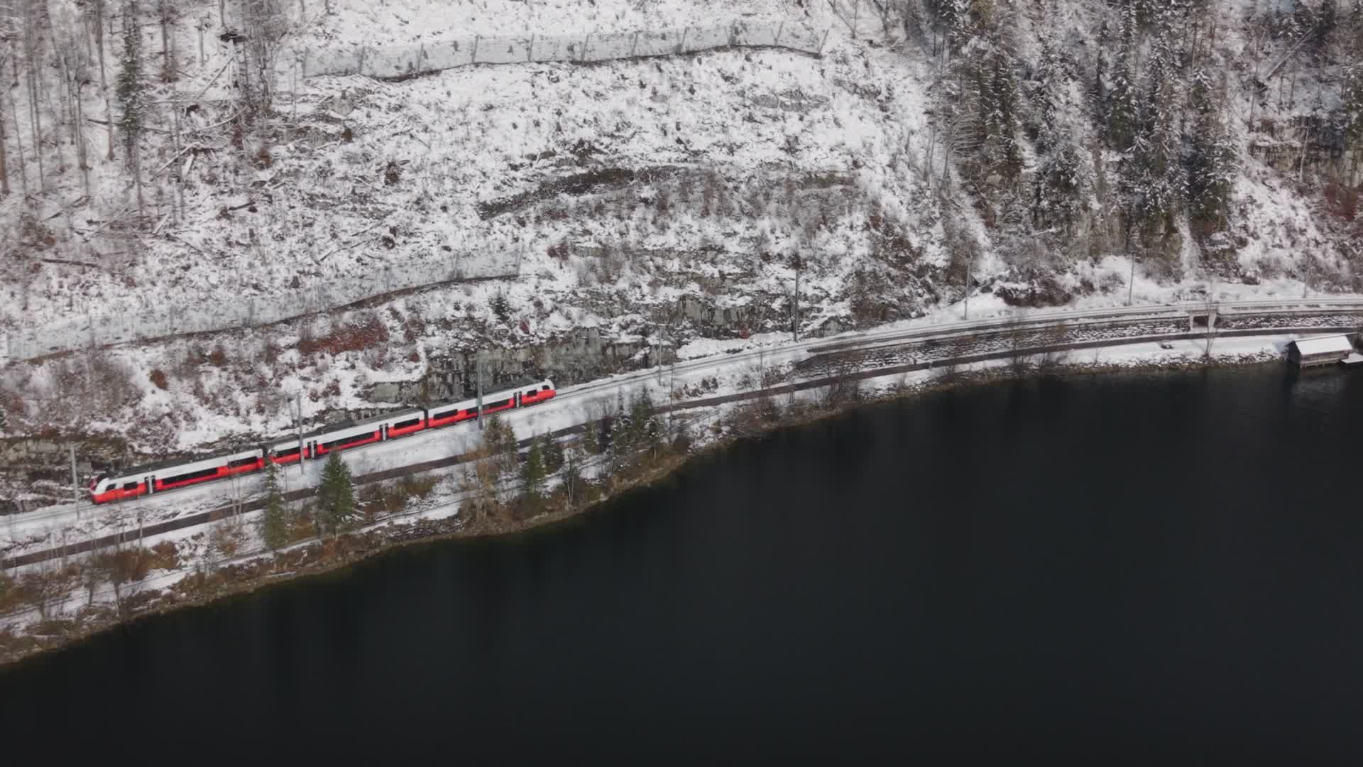 Aerial Shot of Train on Snowy Cliffside Free Stock Video Footage ...