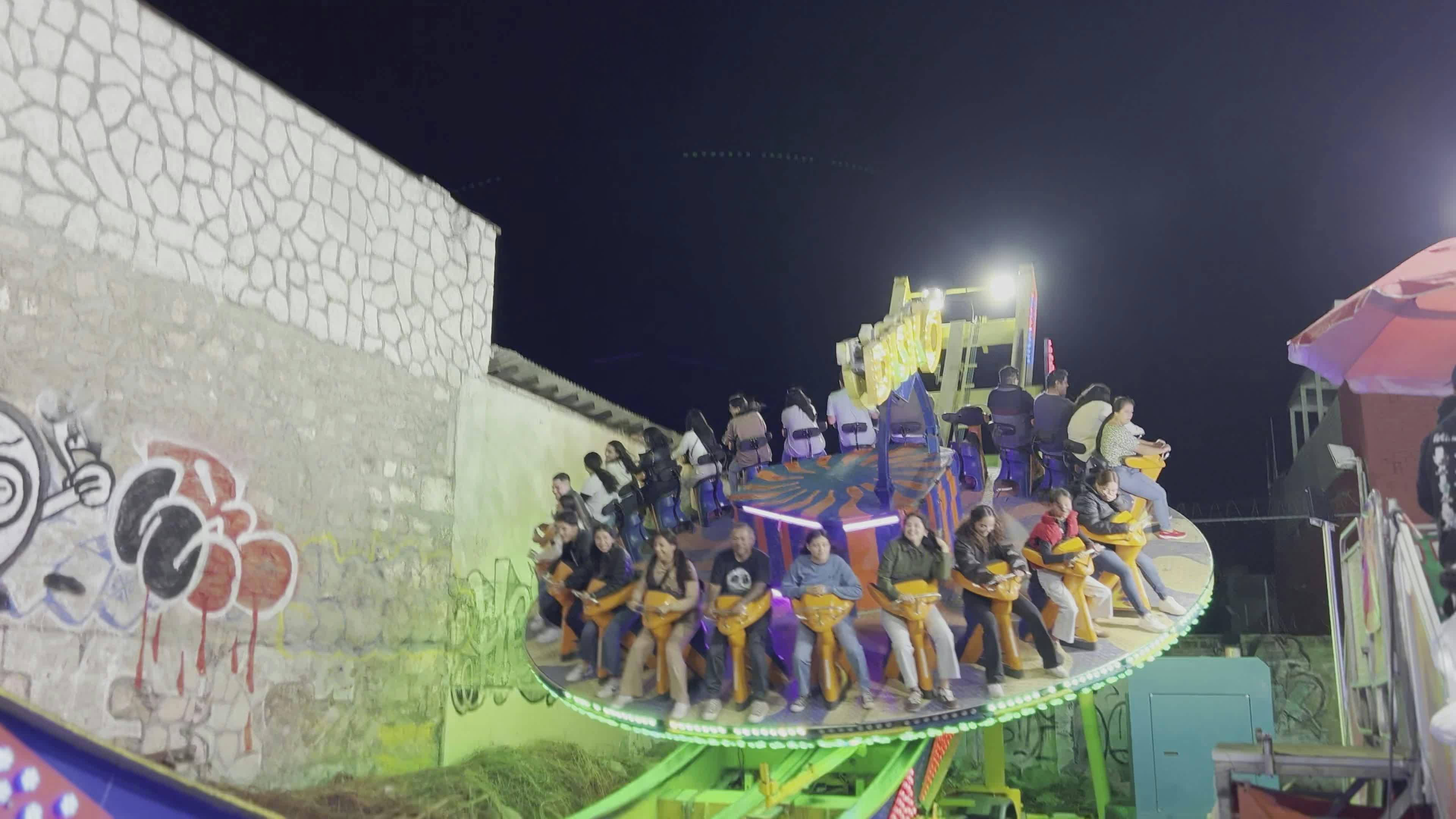 Exciting Night Ride at a Colorful Funfair Free Stock Video Footage ...