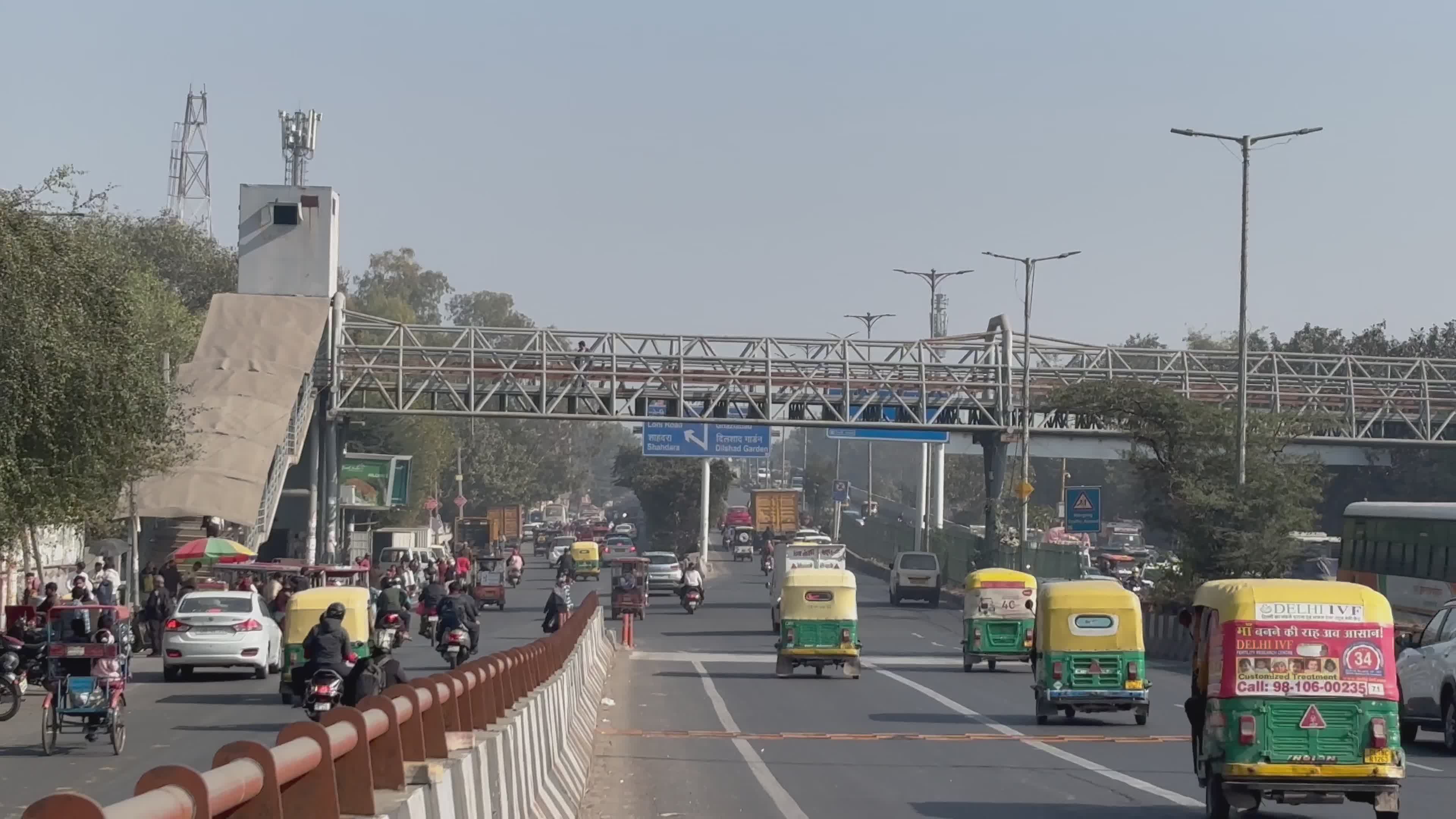 Busy Delhi Road with Vehicles and Pedestrians Free Stock Video Footage ...