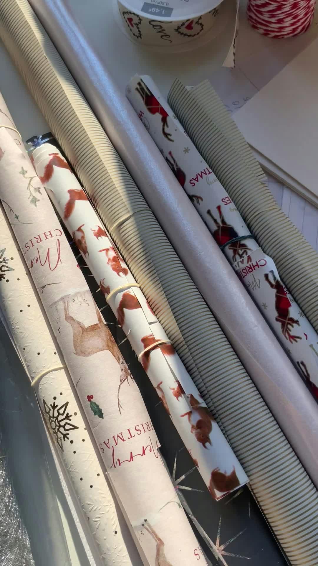 Festive Gift Wrapping With Decorative Paper Free Stock Video Footage ...