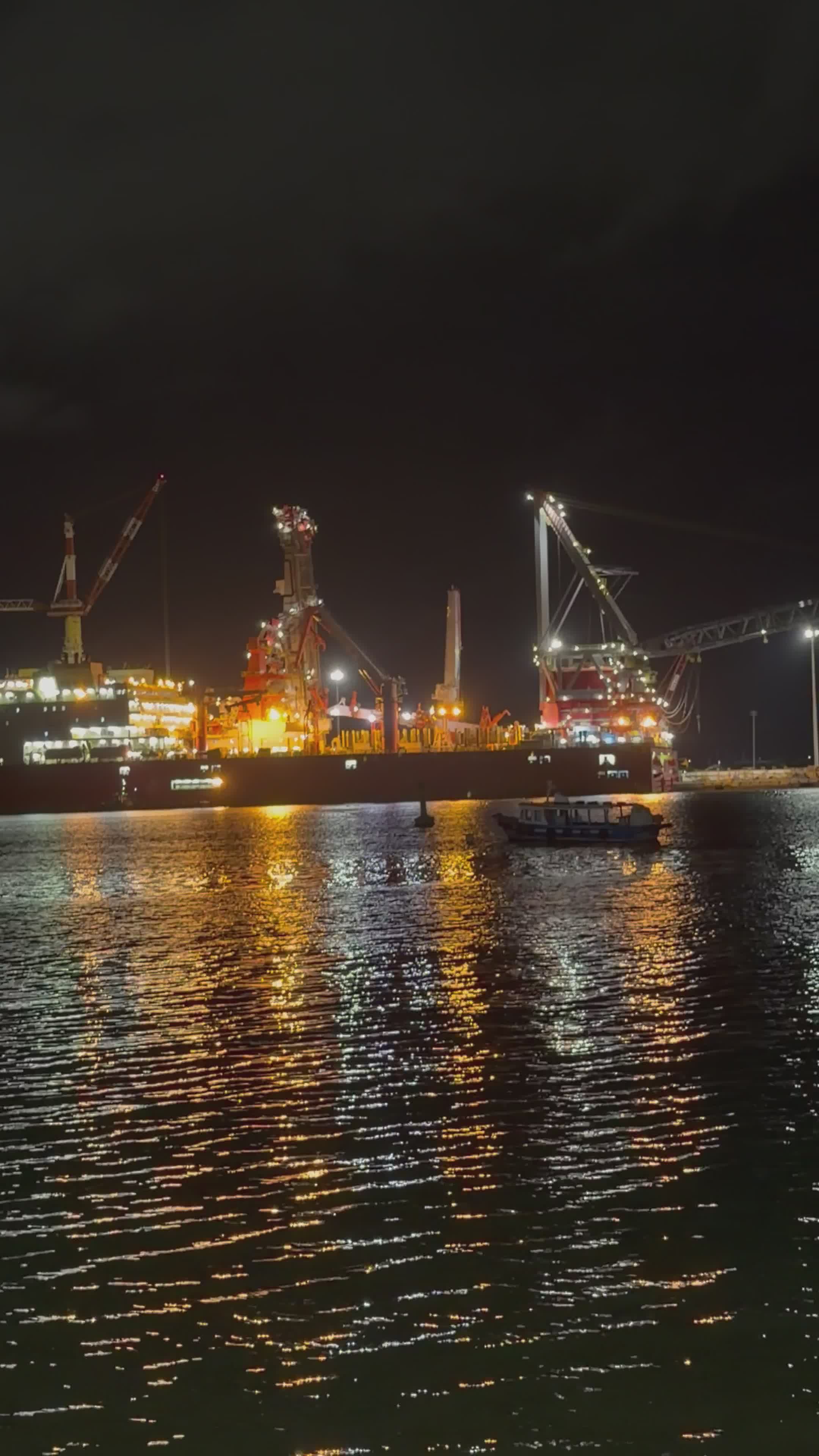 Illuminated Shipyard Night View with Reflections Free Stock Video ...