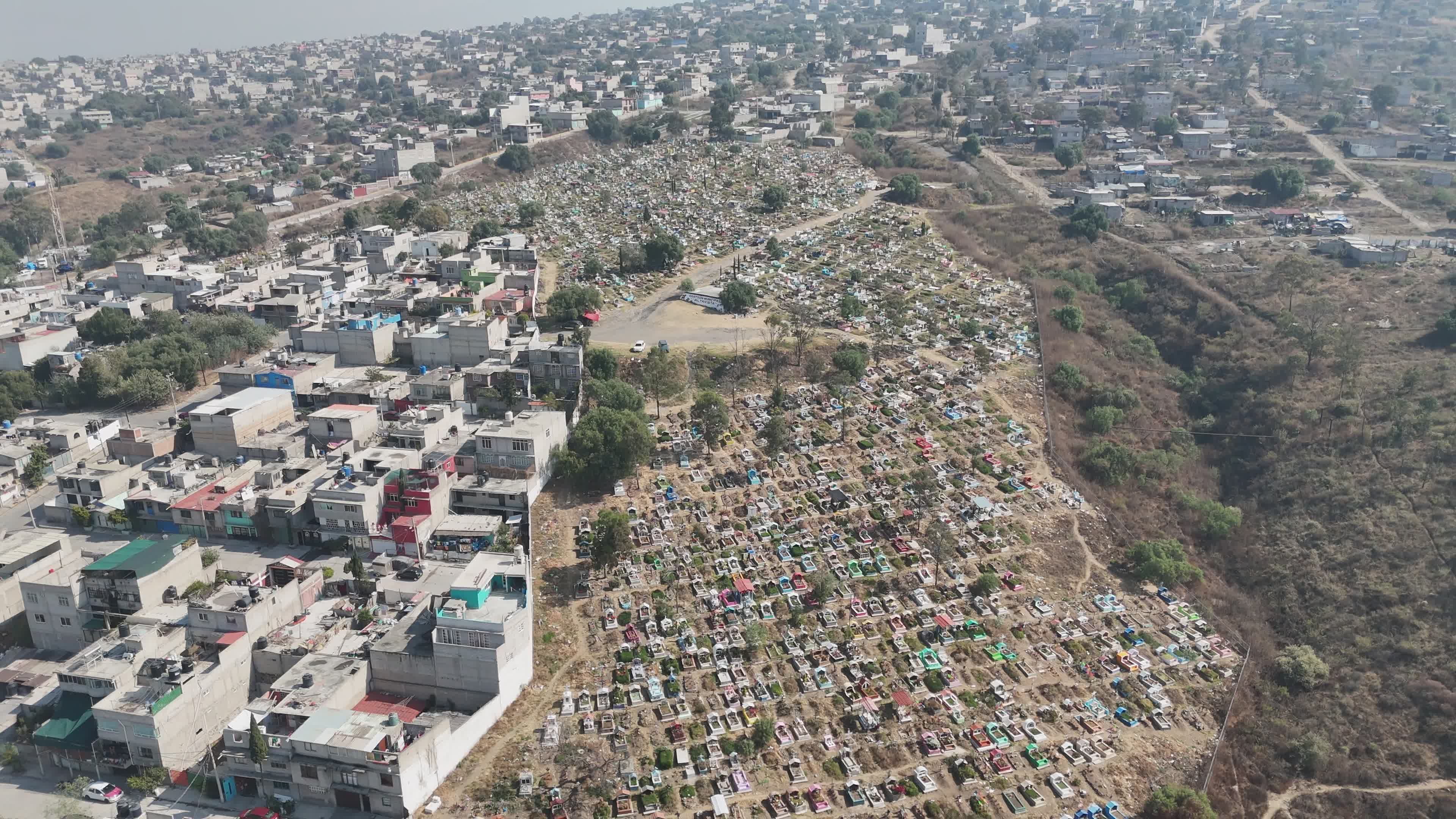 Aerial View of Urban City and Cemetery Landscape Free Stock Video ...