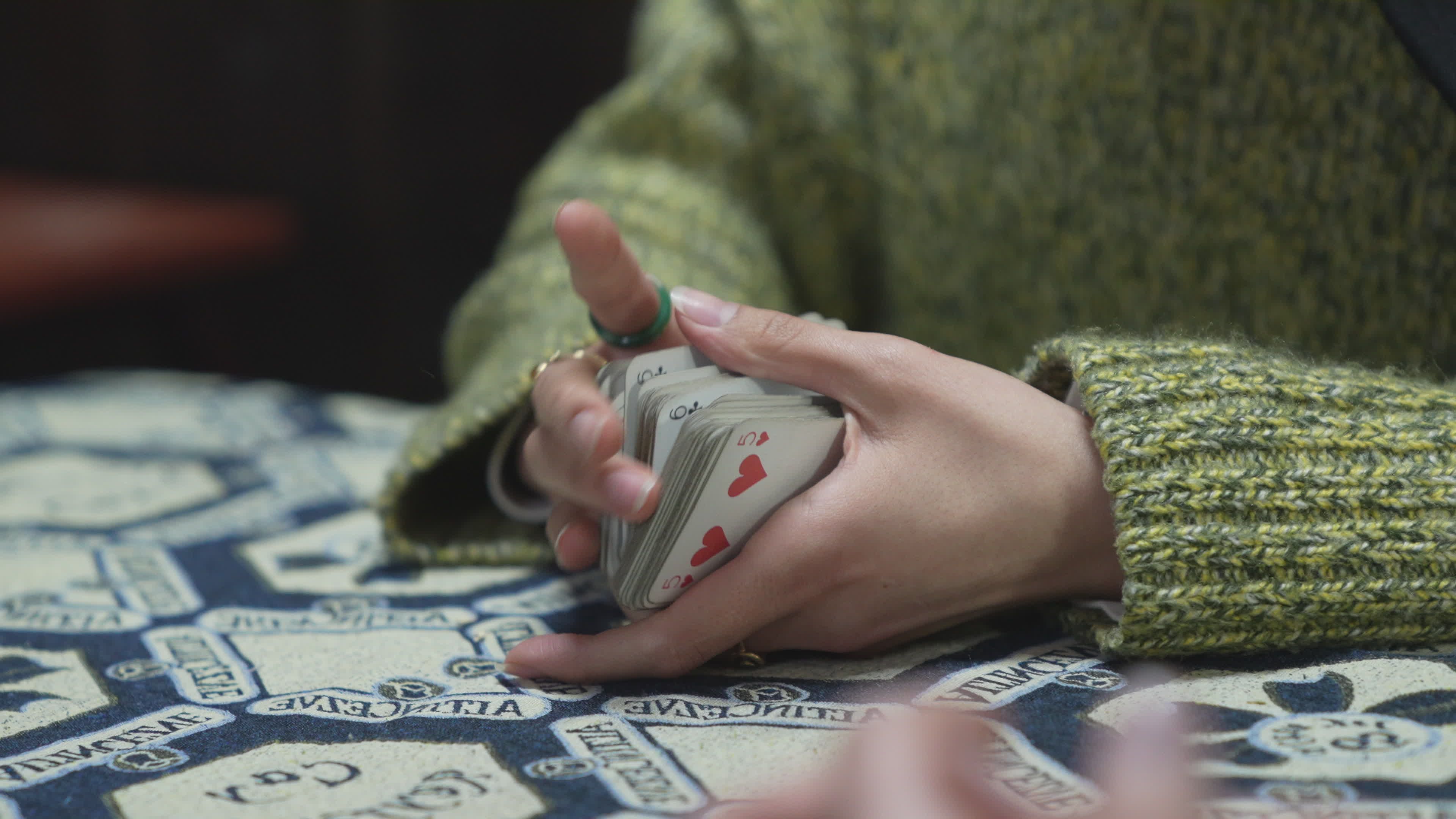 Close-up of Card Shuffling on Patterned Table Free Stock Video Footage ...