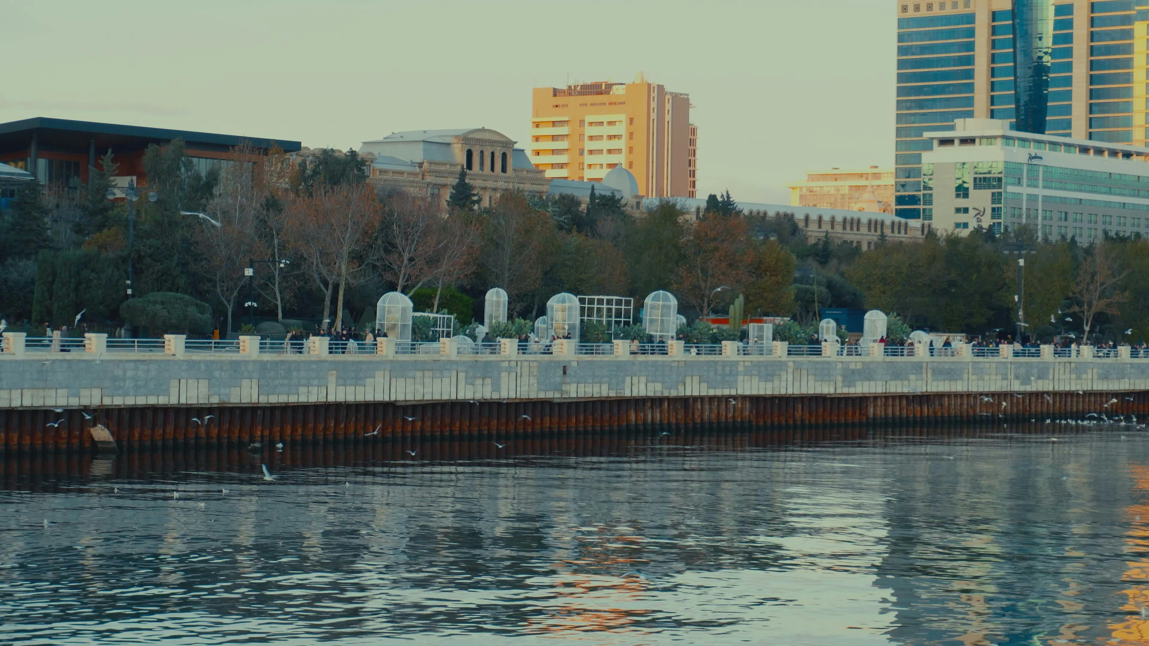 Scenic Urban Riverfront with Modern Buildings Free Stock Video Footage ...