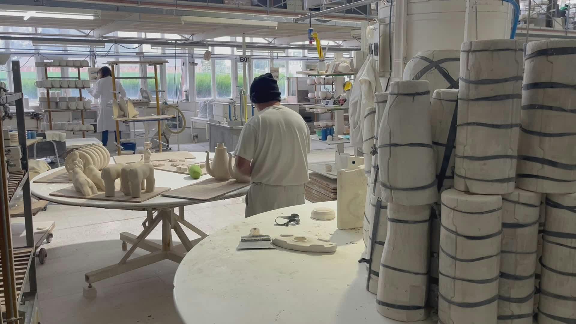 Artisan Shaping Pottery in Busy Ceramic Workshop Free Stock Video ...