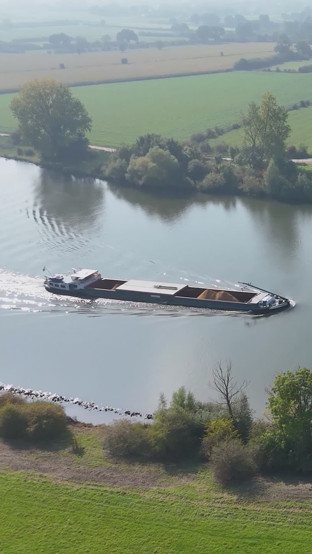 Aerial View of Cargo Barge on Serene River Free Stock Video Footage ...